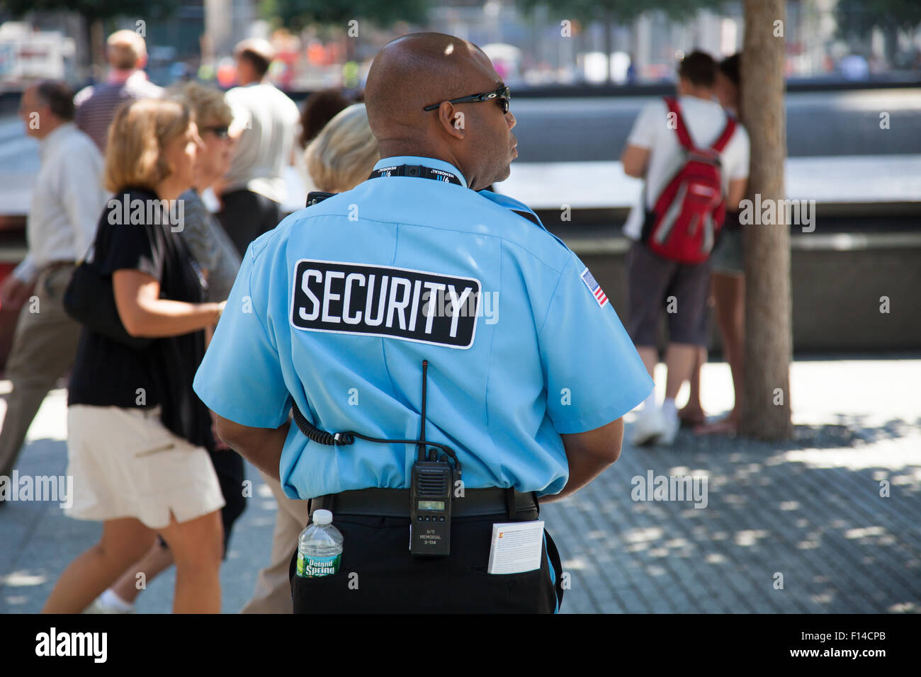 Security guard on duty at 9/11 memorial Stock Photo - Alamy
