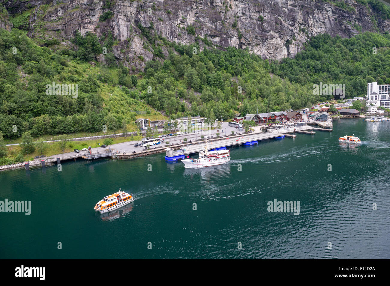Tender boats from the P&O cruise ship Azura transfer passengers to the ...
