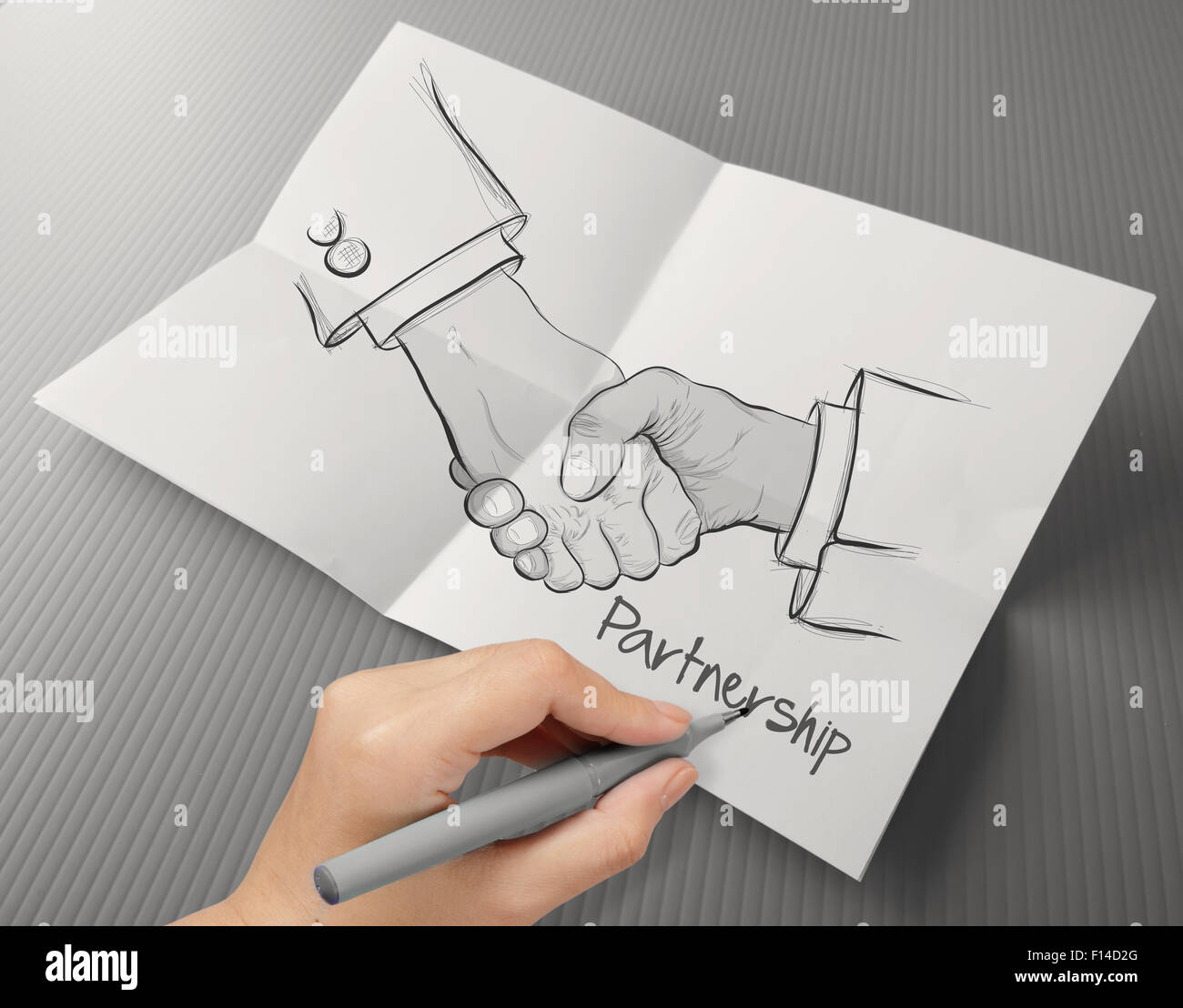 hand drawn handshake sign as partnership business concept Stock Photo ...