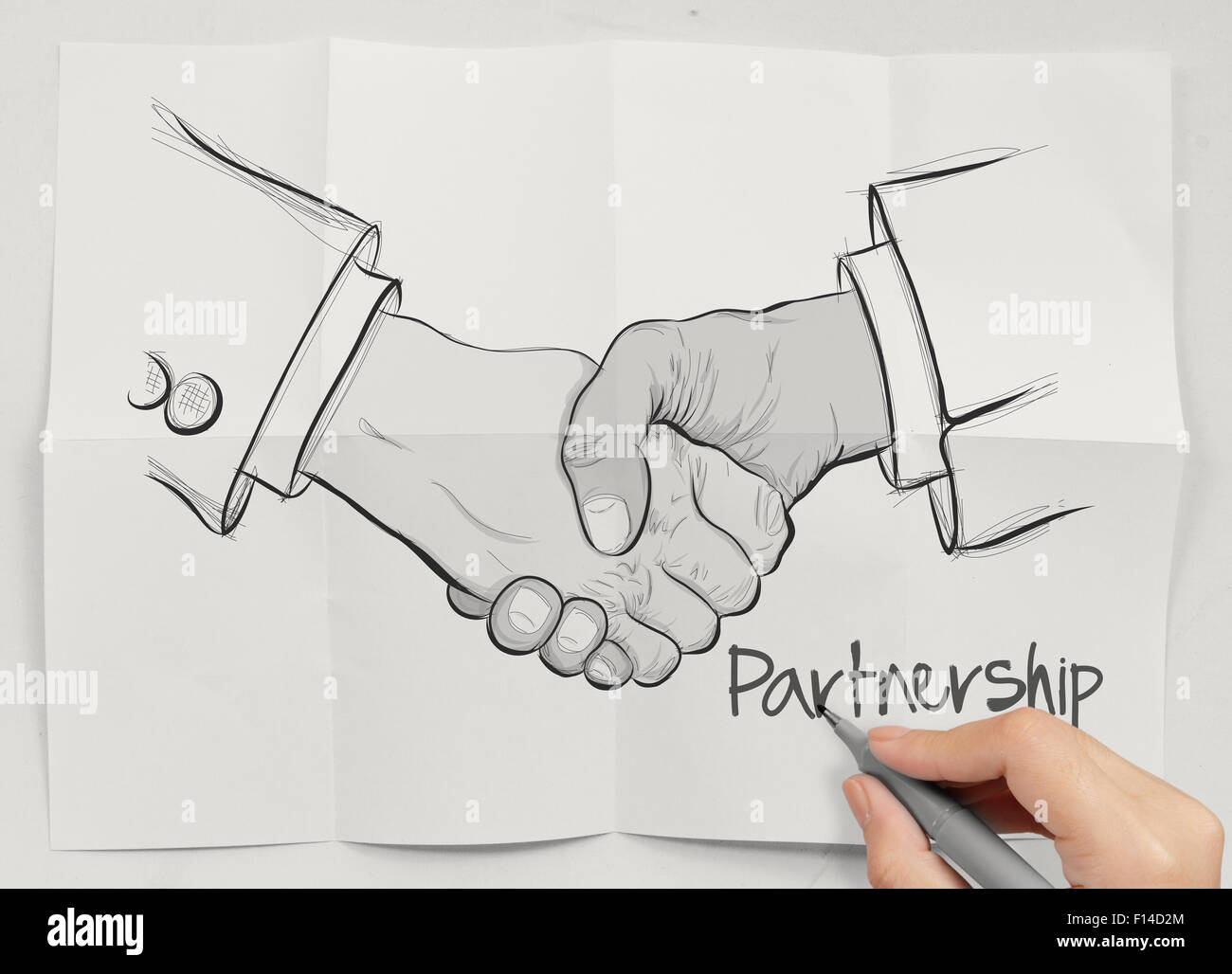 hand drawn handshake sign as partnership business concept Stock Photo ...
