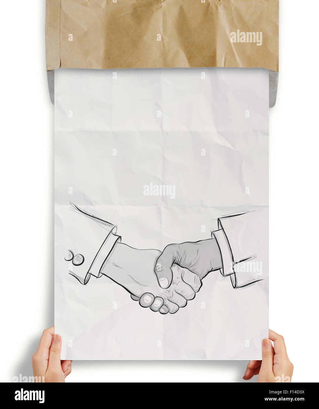 hand drawn handshake sign on crumpled paper as partnership business ...