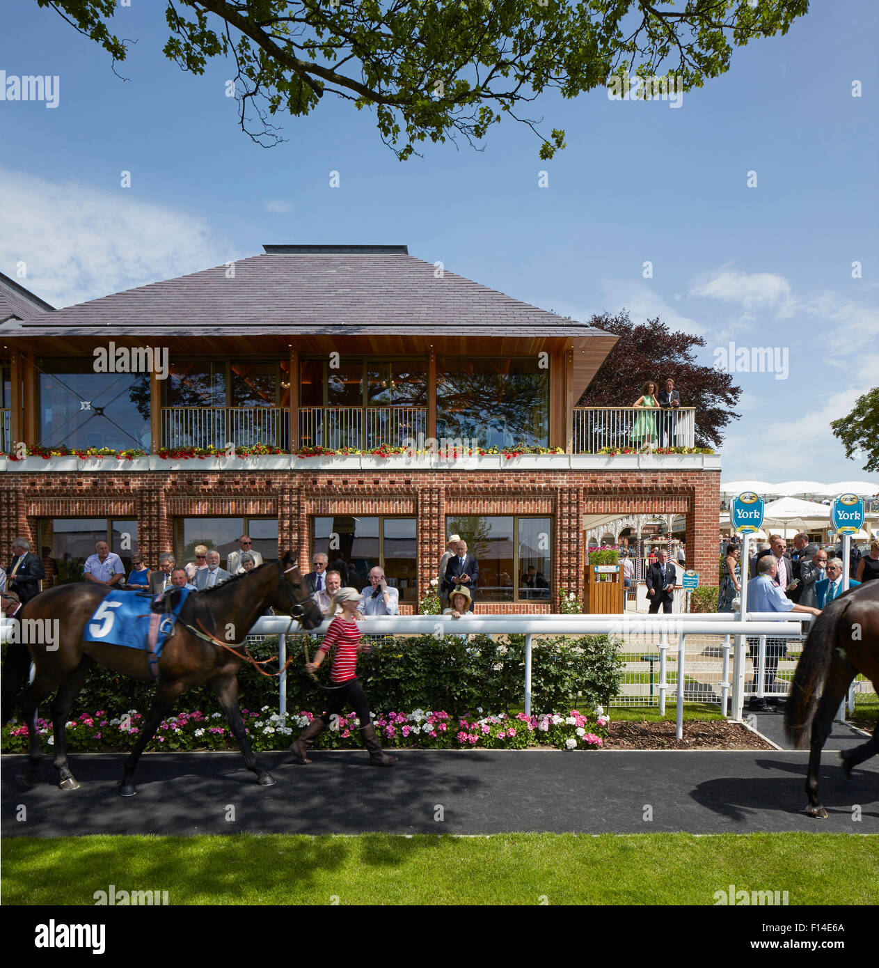 Pre-parade ring with Weigh-In Building beyond. York Racecourse, York ...
