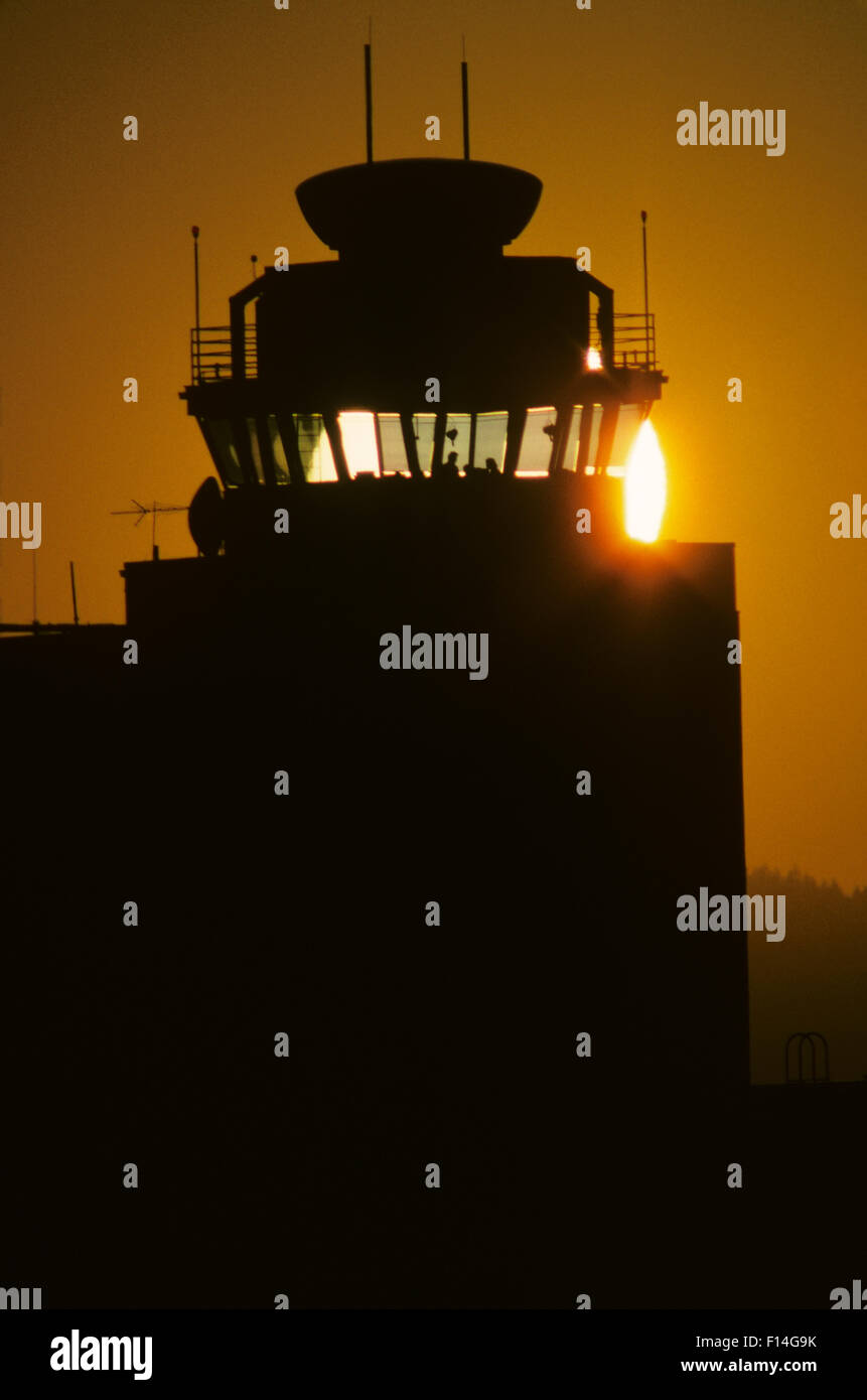 SILHOUETTED AIR CONTROL TOWER SETTING SUN PORTLAND, OREGON Stock Photo ...