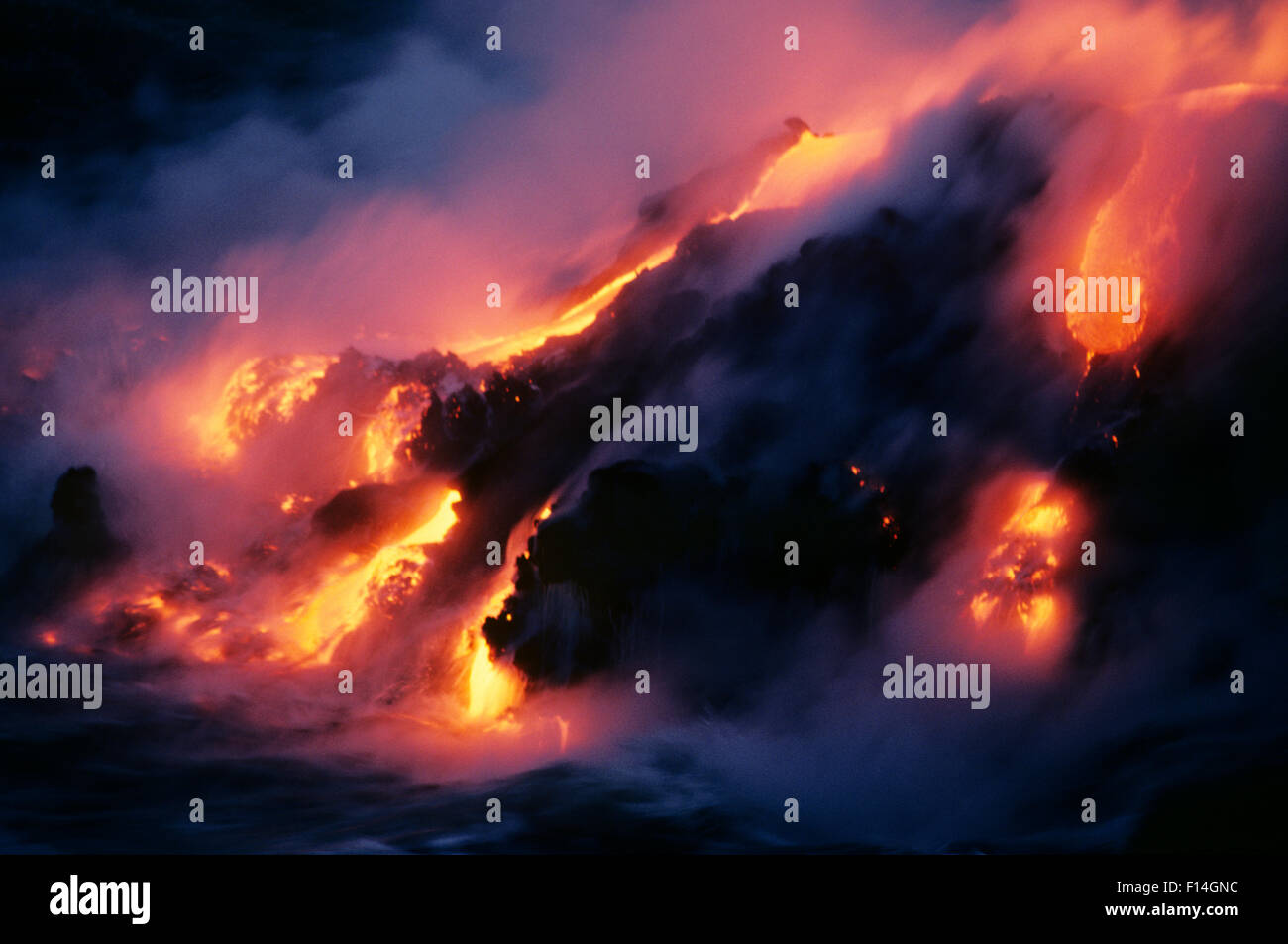 FIERY LAVA STREAMING INTO OCEAN HAWAII Stock Photo - Alamy
