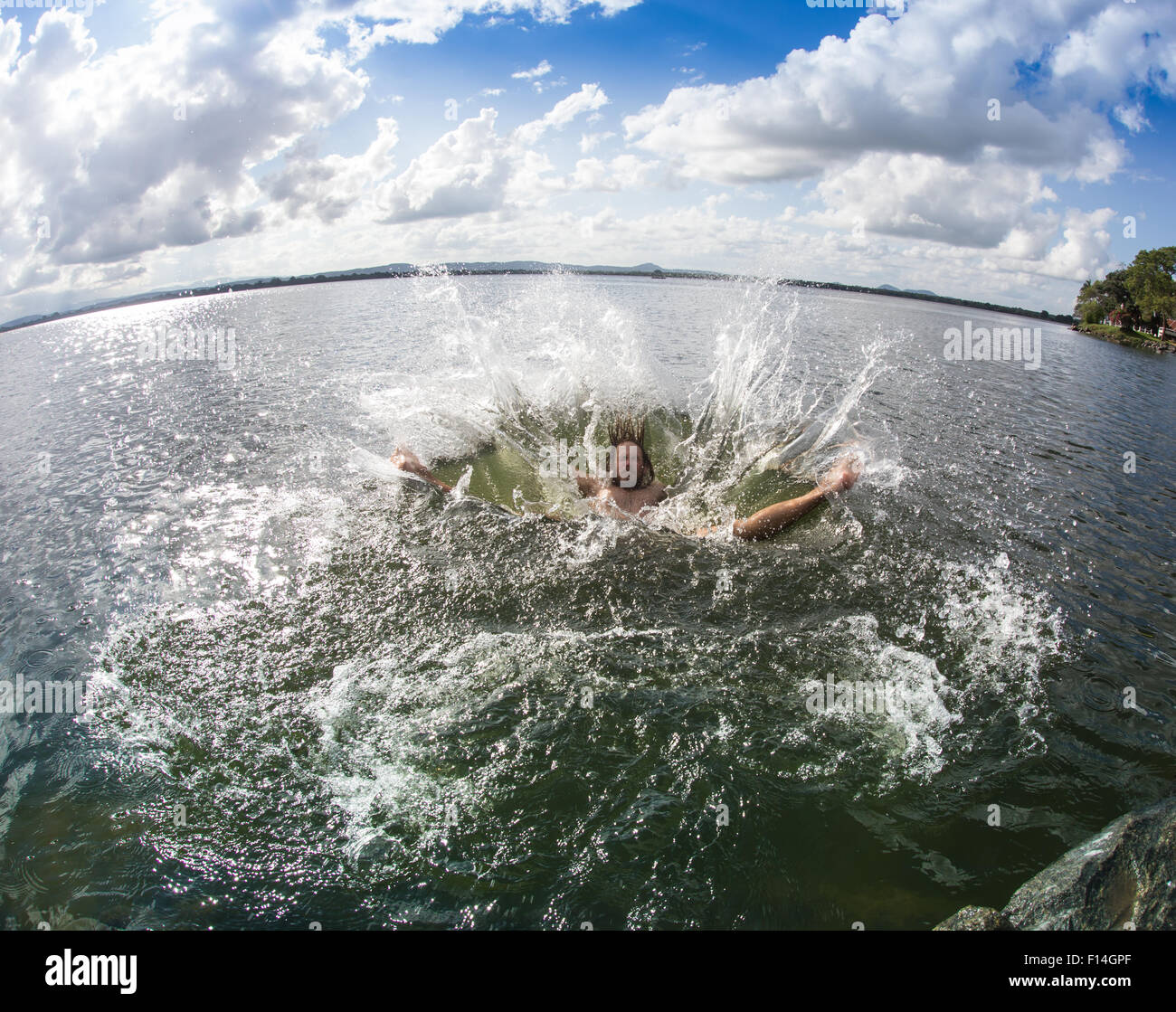 Boy diving into river hi-res stock photography and images - Alamy