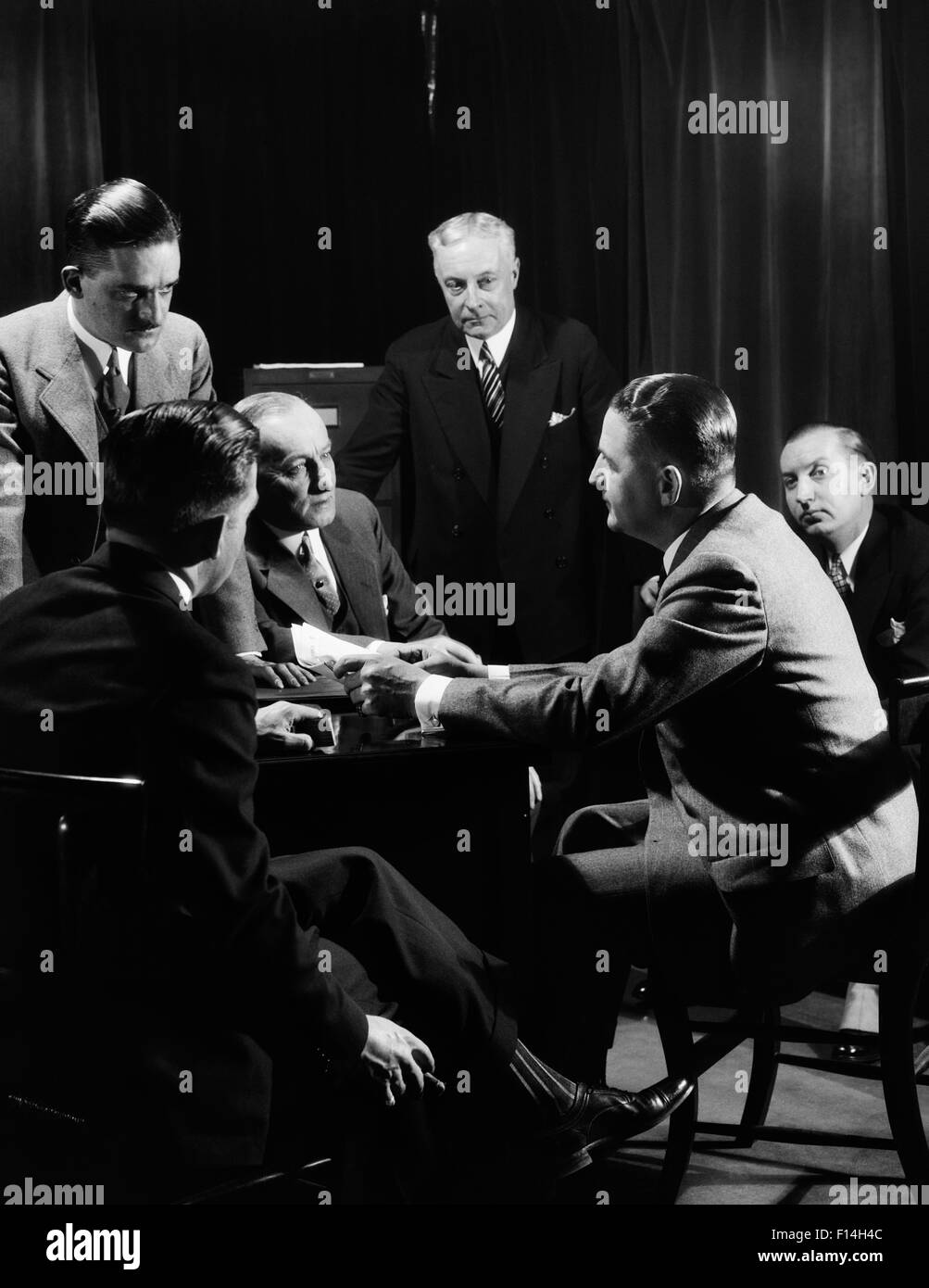 1920s 1930s SIX EXECUTIVE MEN MEETING IN BOARD ROOM CONFERENCE Stock ...