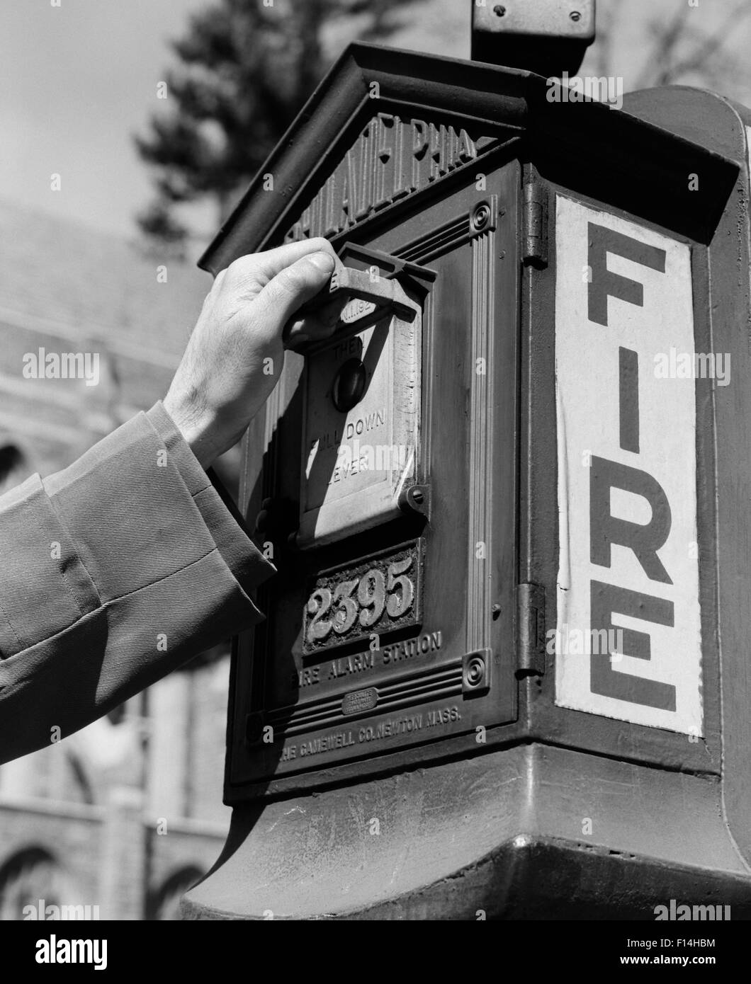1920s 1930s 1940s 1950s MALE HAND PULLING LEVER ON STREET FIRE ALARM ...
