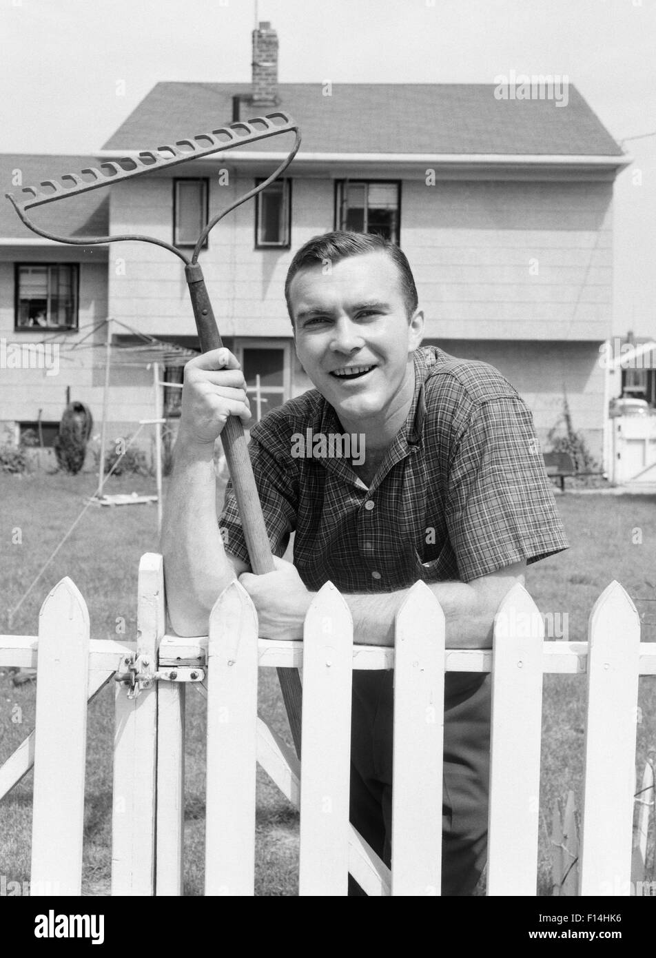 Hands house man in Black and White Stock Photos & Images - Alamy