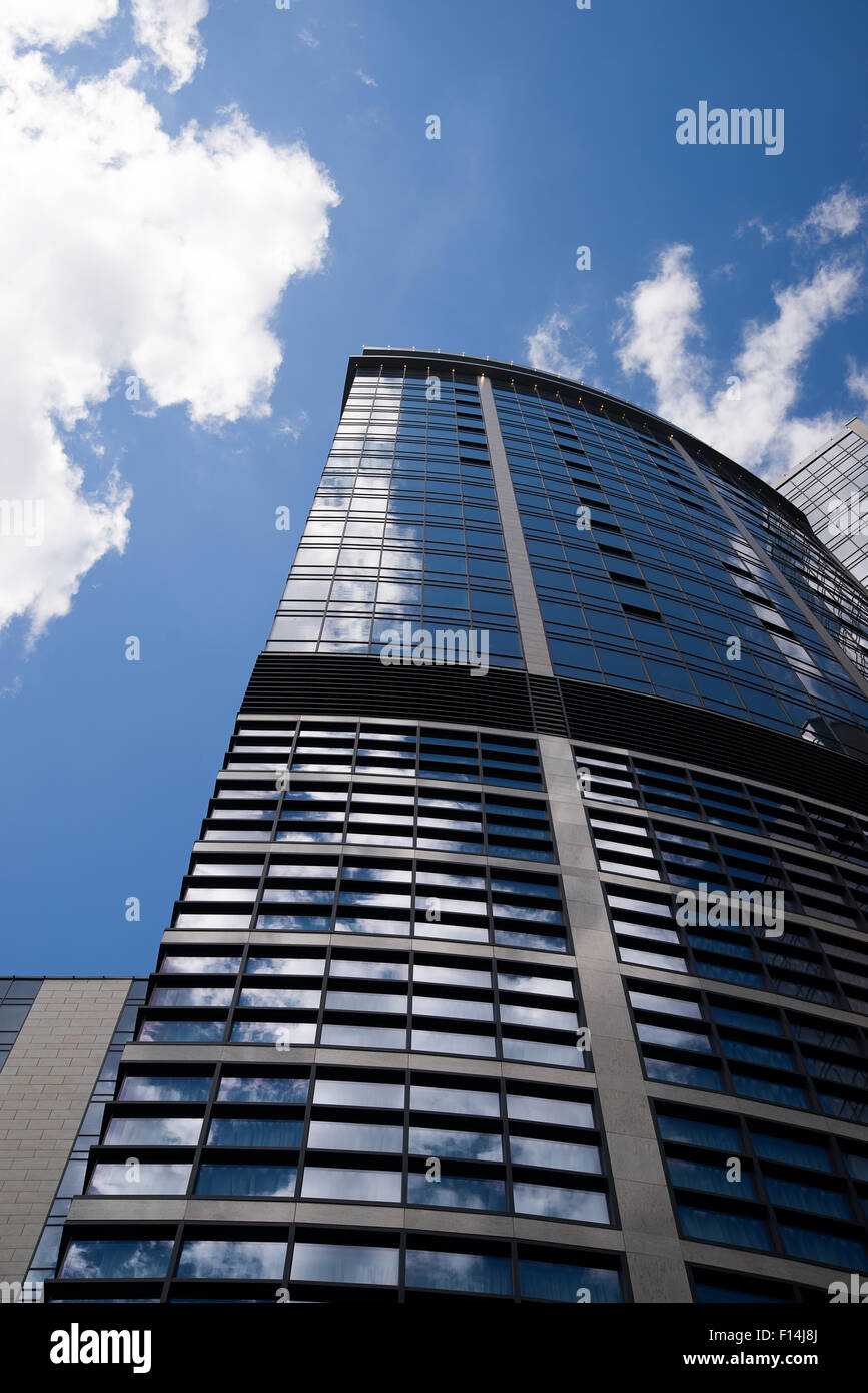 High concrete building against the blue sky Stock Photo - Alamy