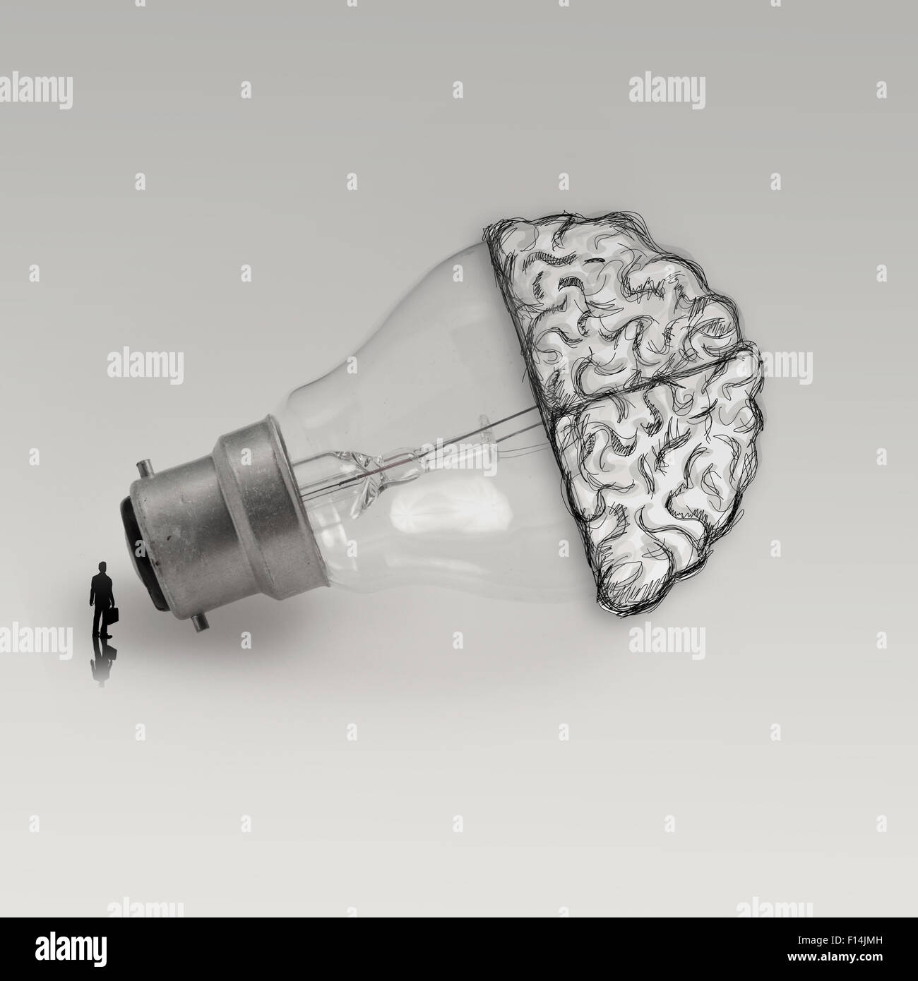 businessman looking at Light bulb with hand drawn brain as creative ...