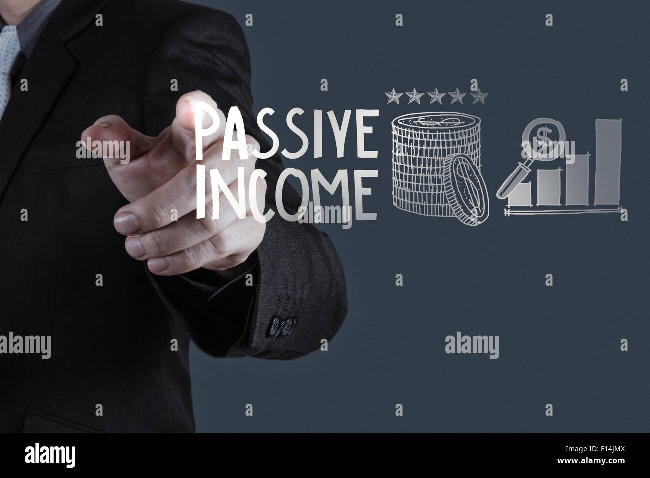 businessman hand pointing passive income touch screen computer as ...