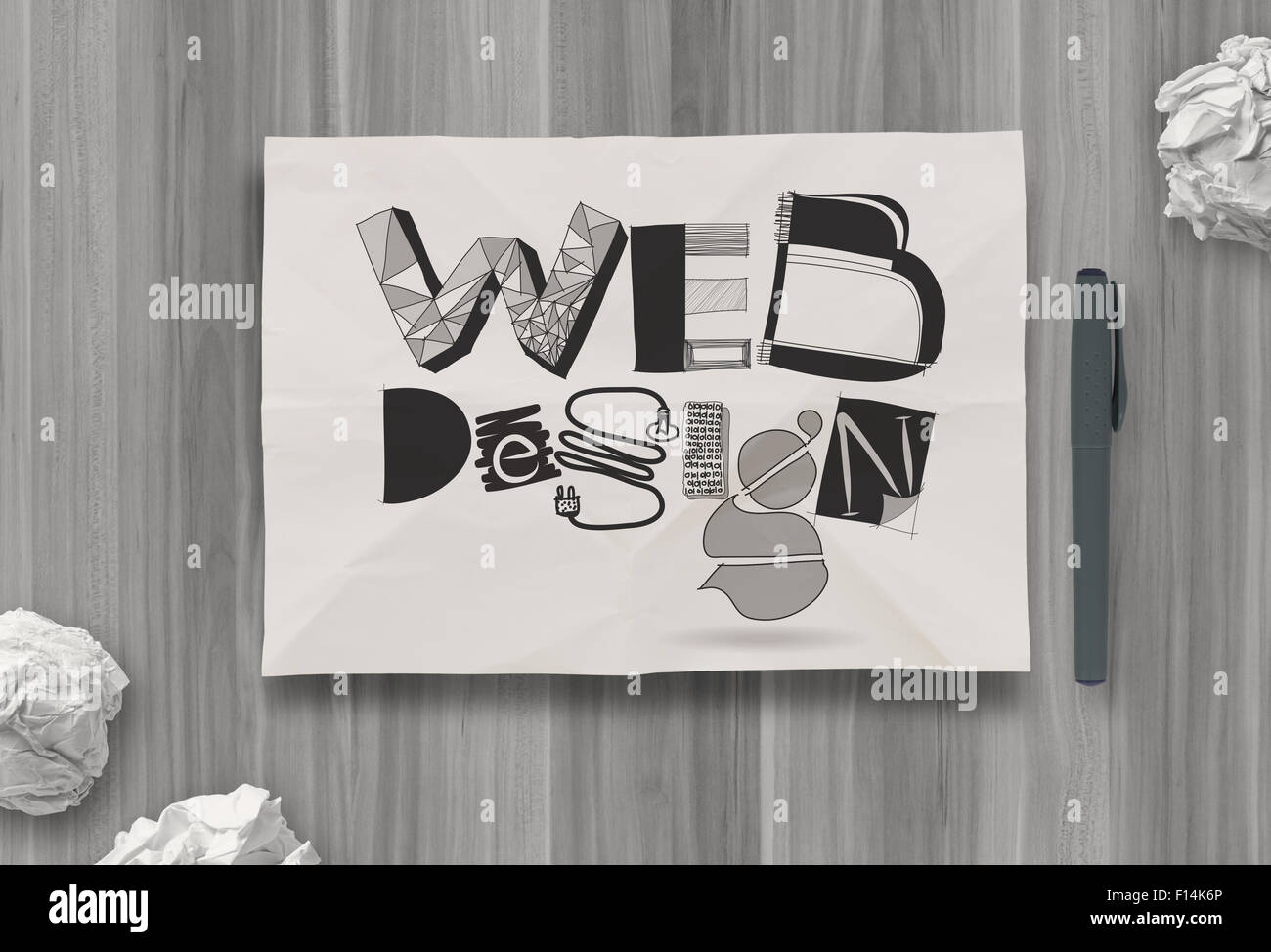 hand drawn web design diagram on crumpled paper background as concept ...