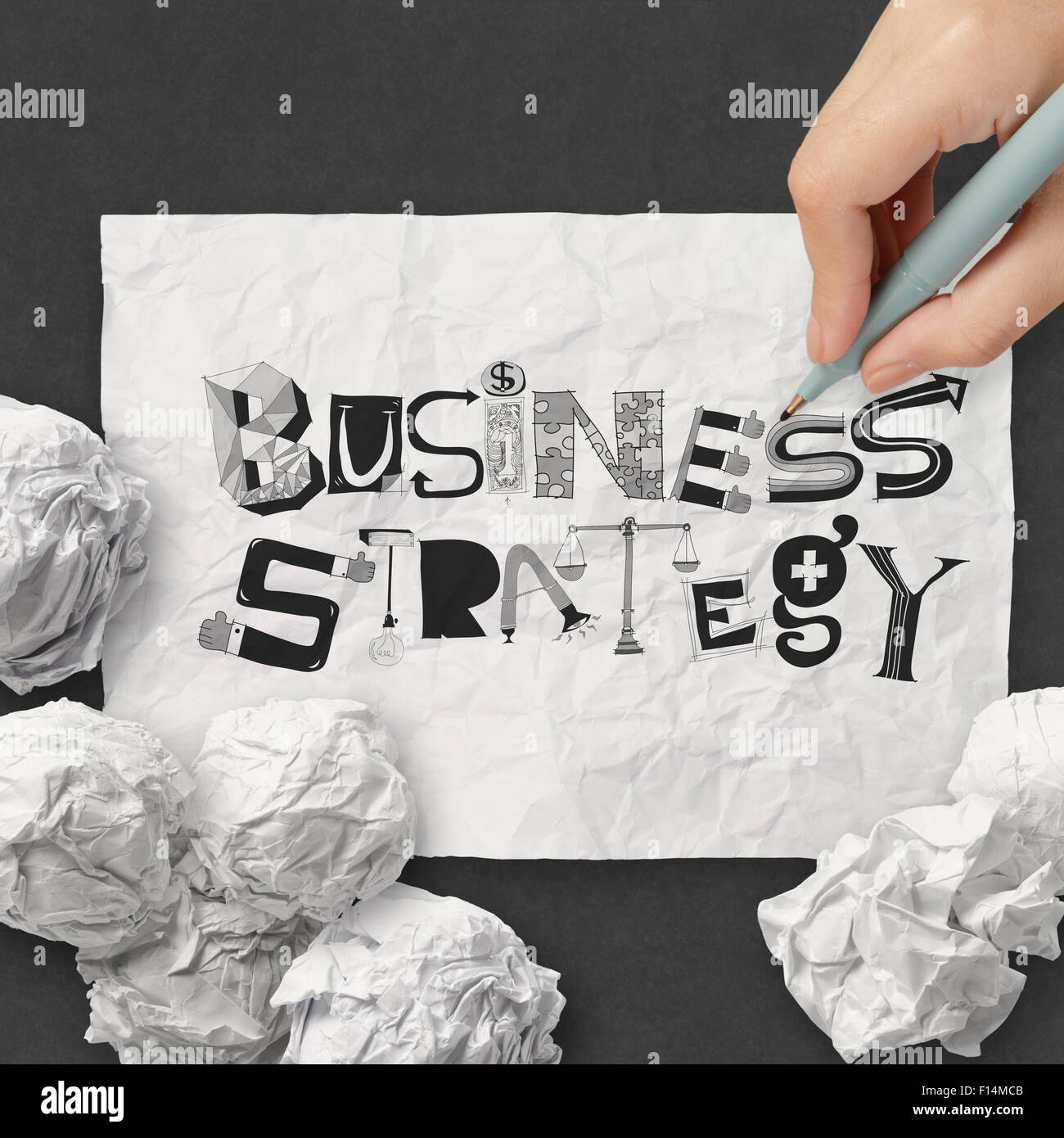 hand drawing on crumpled paper with design word BUSINESS STRATEGY as ...