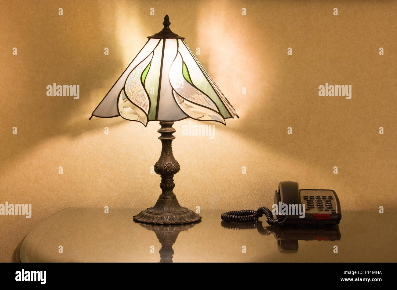 table lamp and phone on desk Stock Photo - Alamy