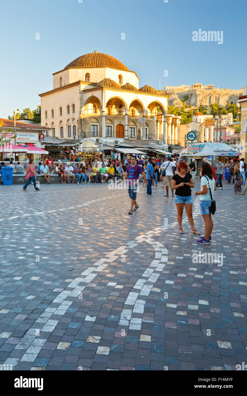People at the mosque and metro station in Monastiraki square in Athens ...