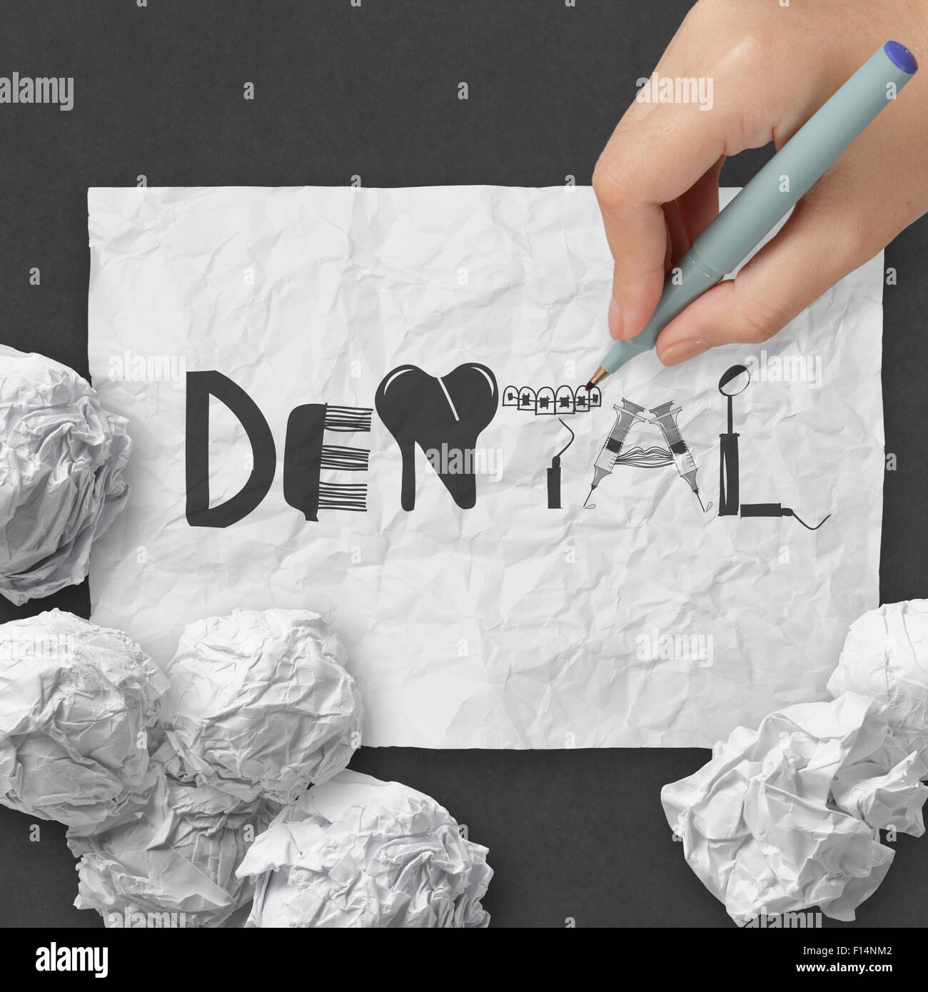 hand drawing design word DENTAL on white crumpled paper and texture ...