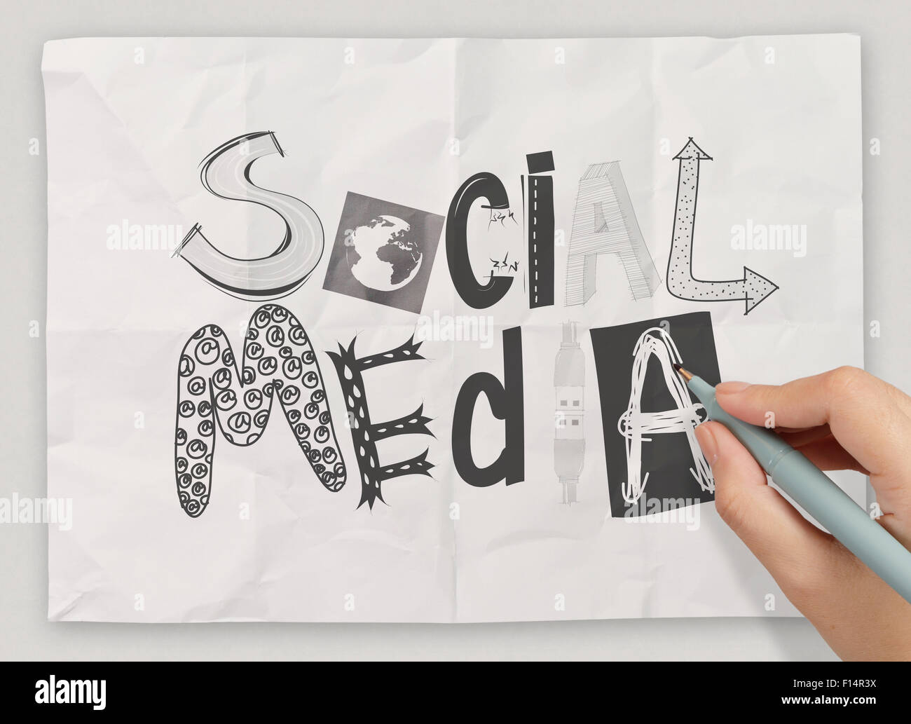 hand drawing design word SOCIAL MEDIA on crumpled paper background as ...