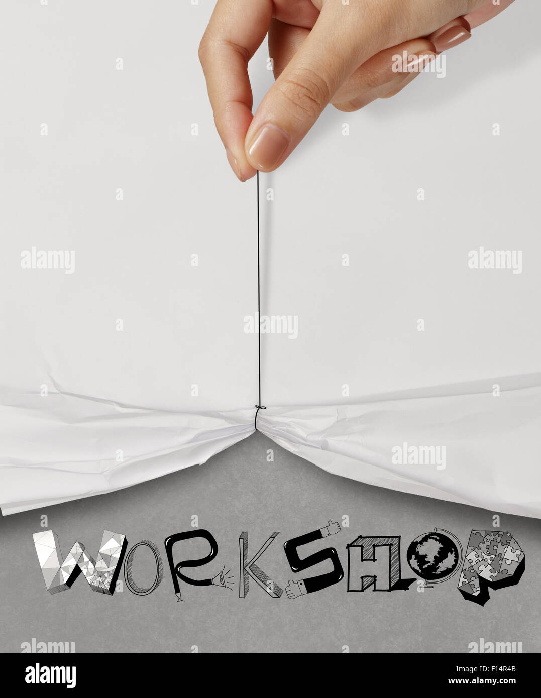 business hand pull rope open wrinkled paper show WORKSHOP design text ...