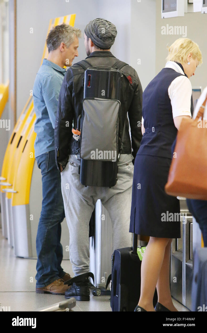 David Garrett smoking a cigarette outside at Tegel airport before ...