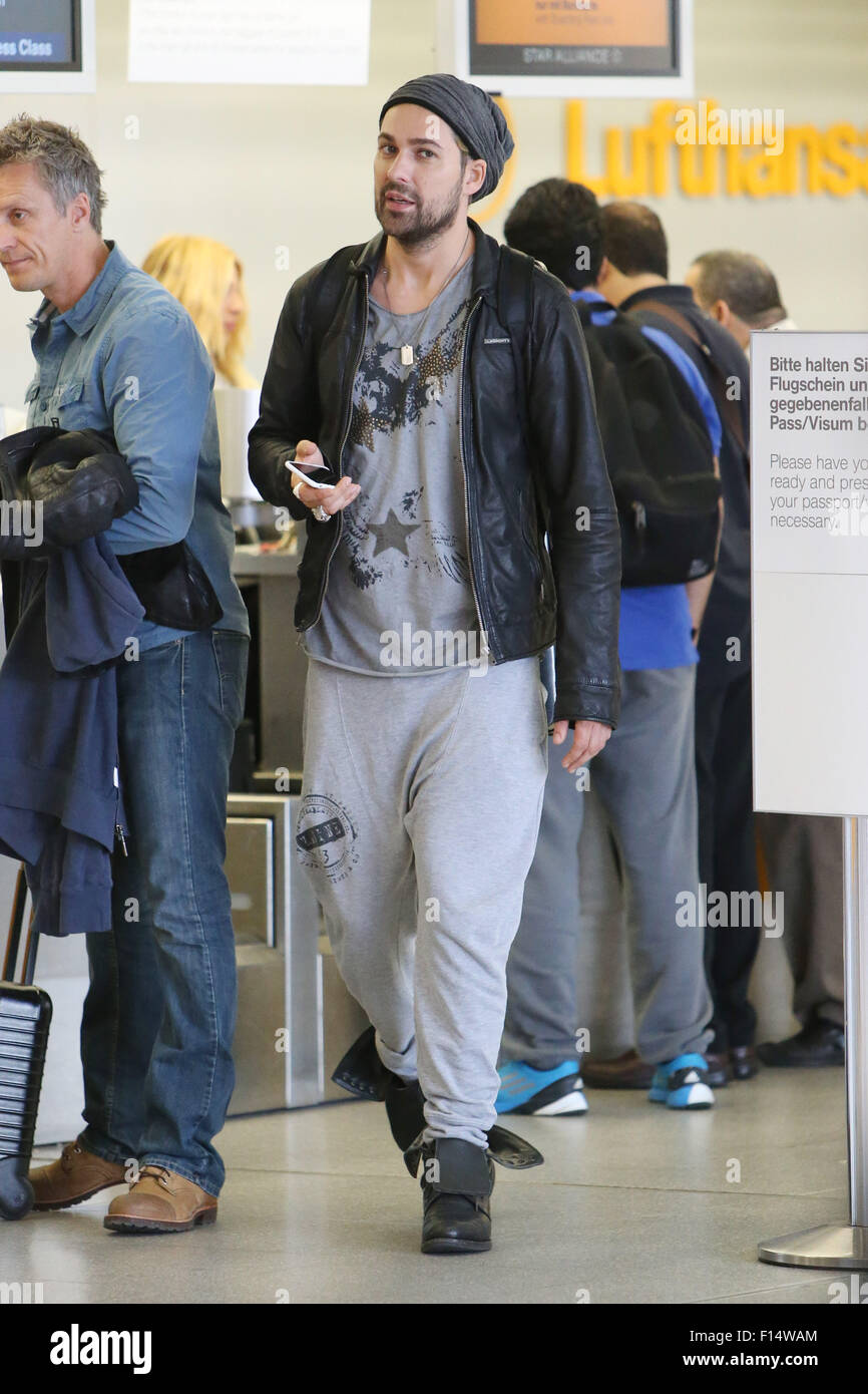 David Garrett smoking a cigarette outside at Tegel airport before ...