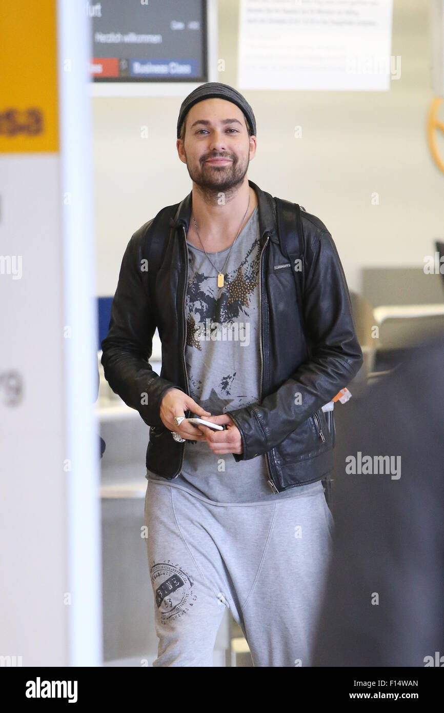 David Garrett smoking a cigarette outside at Tegel airport before ...