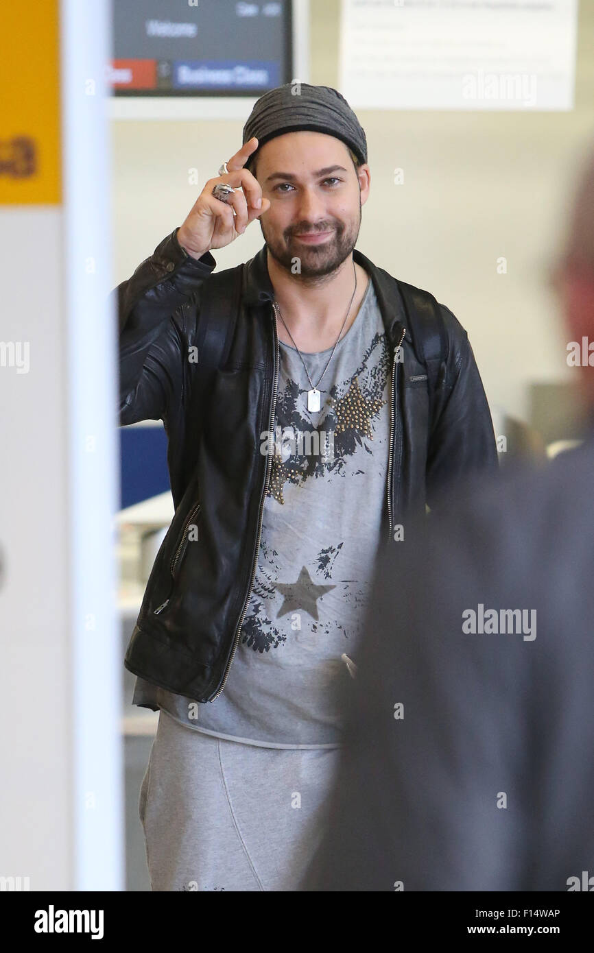 David Garrett smoking a cigarette outside at Tegel airport before ...