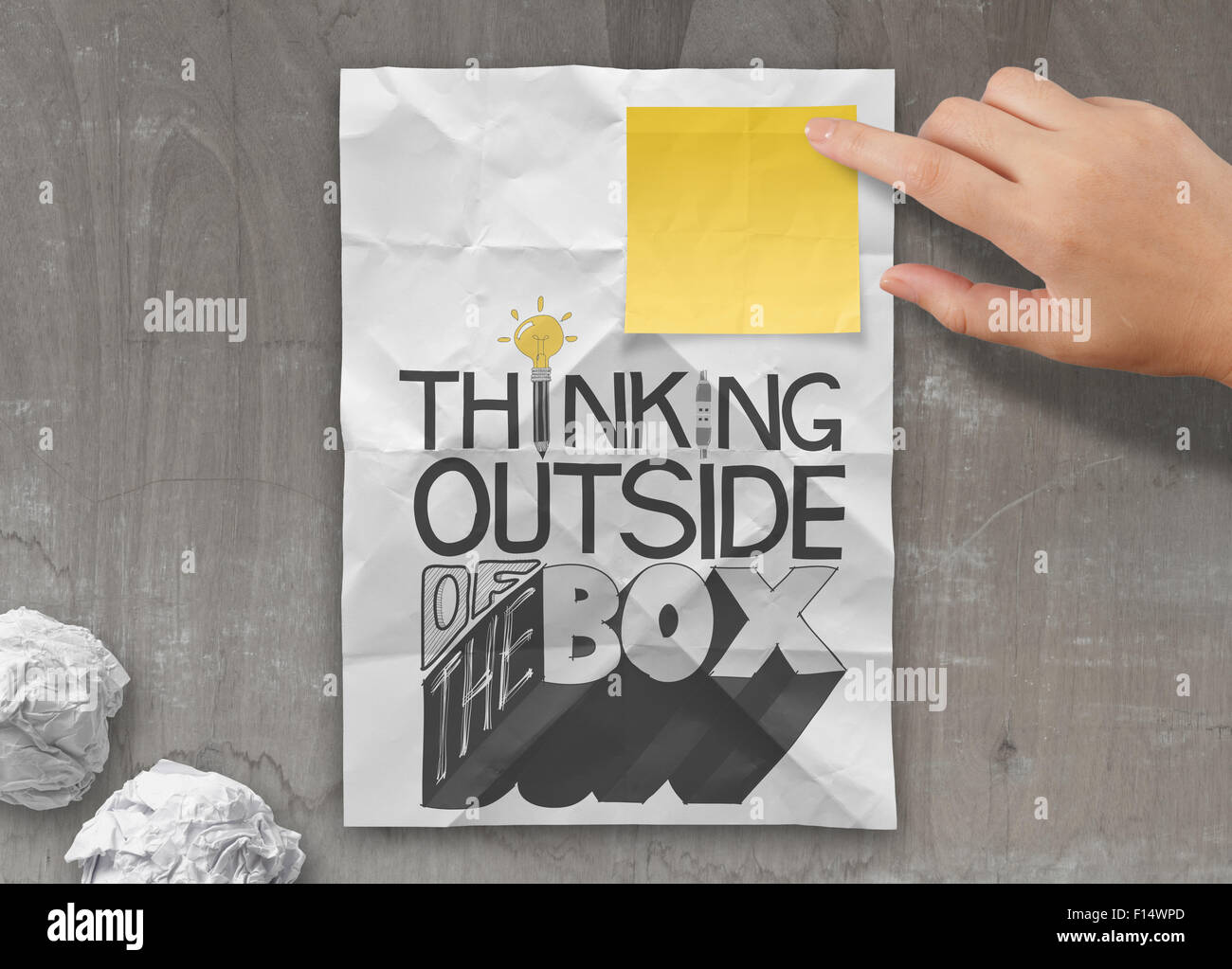 businessman hand showing design word THINKING OUTSIDE OF THE BOX on ...