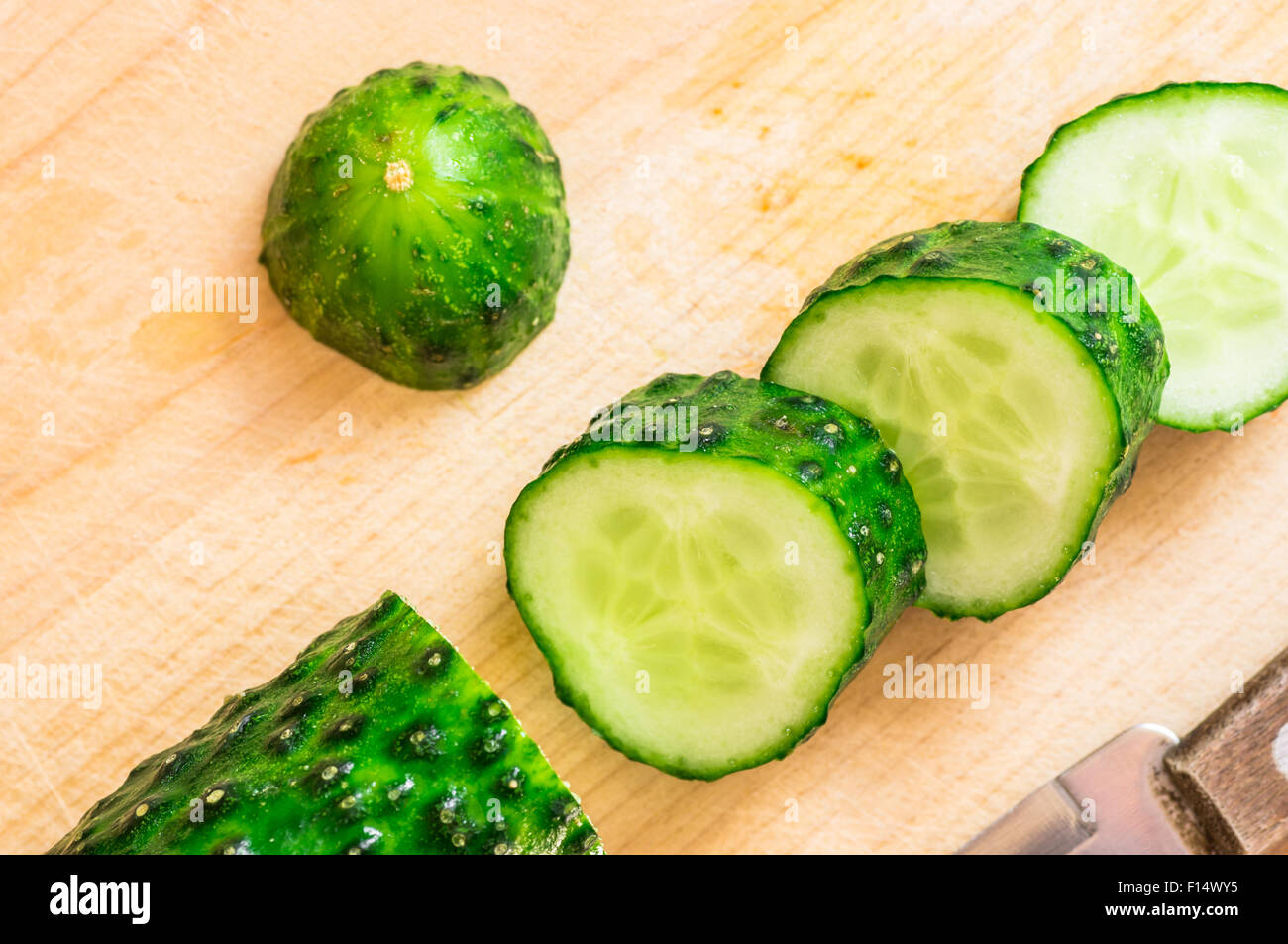Pieces of chopped cucumber top view Stock Photo - Alamy