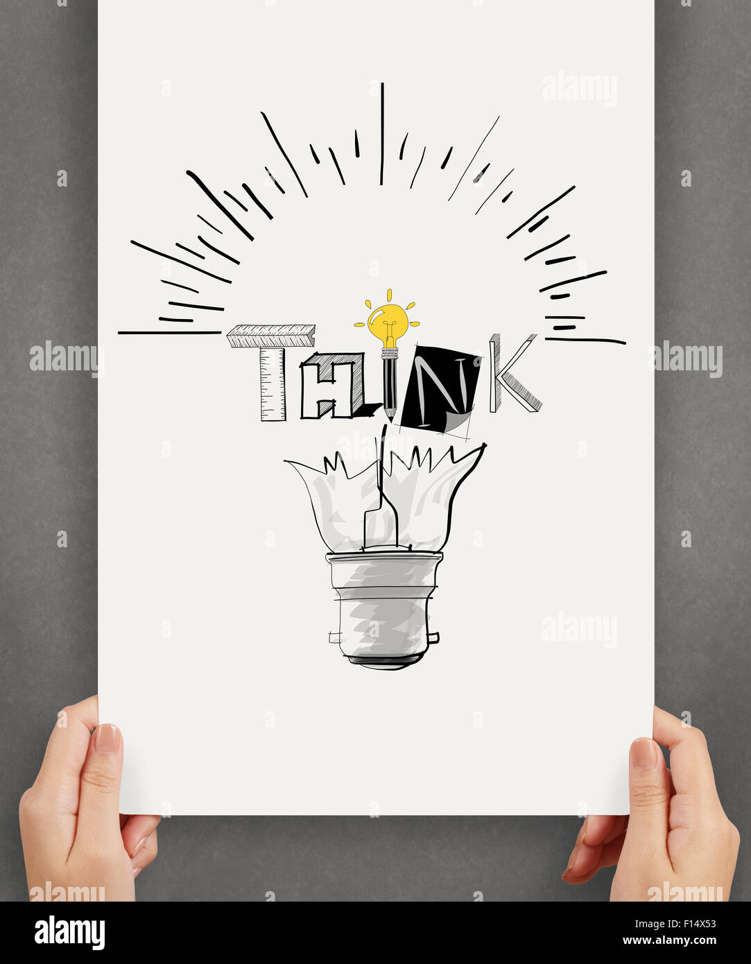 business hand holding poster show hand drawn light bulb and THINK word ...