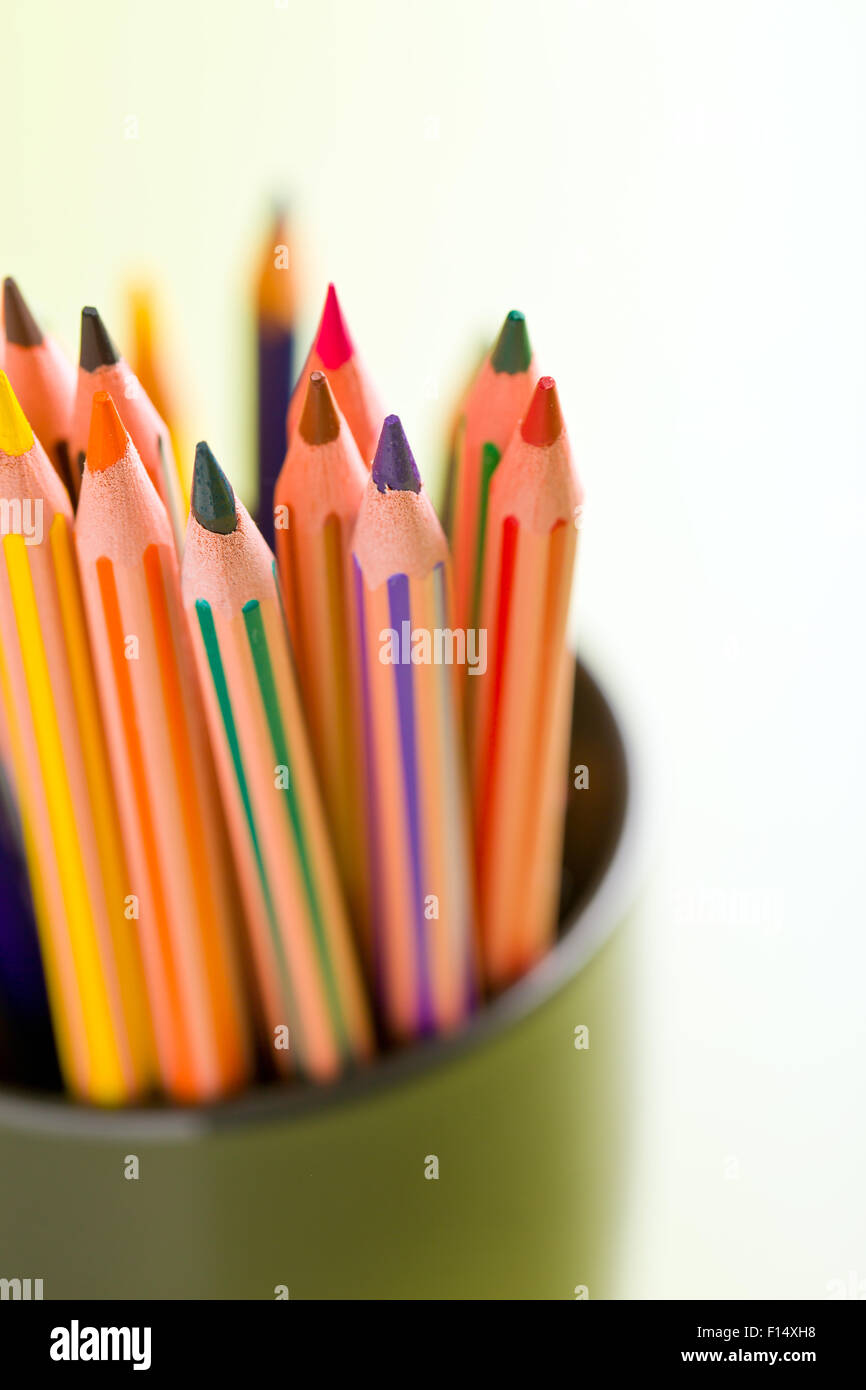 colour pencils in a cup Stock Photo - Alamy