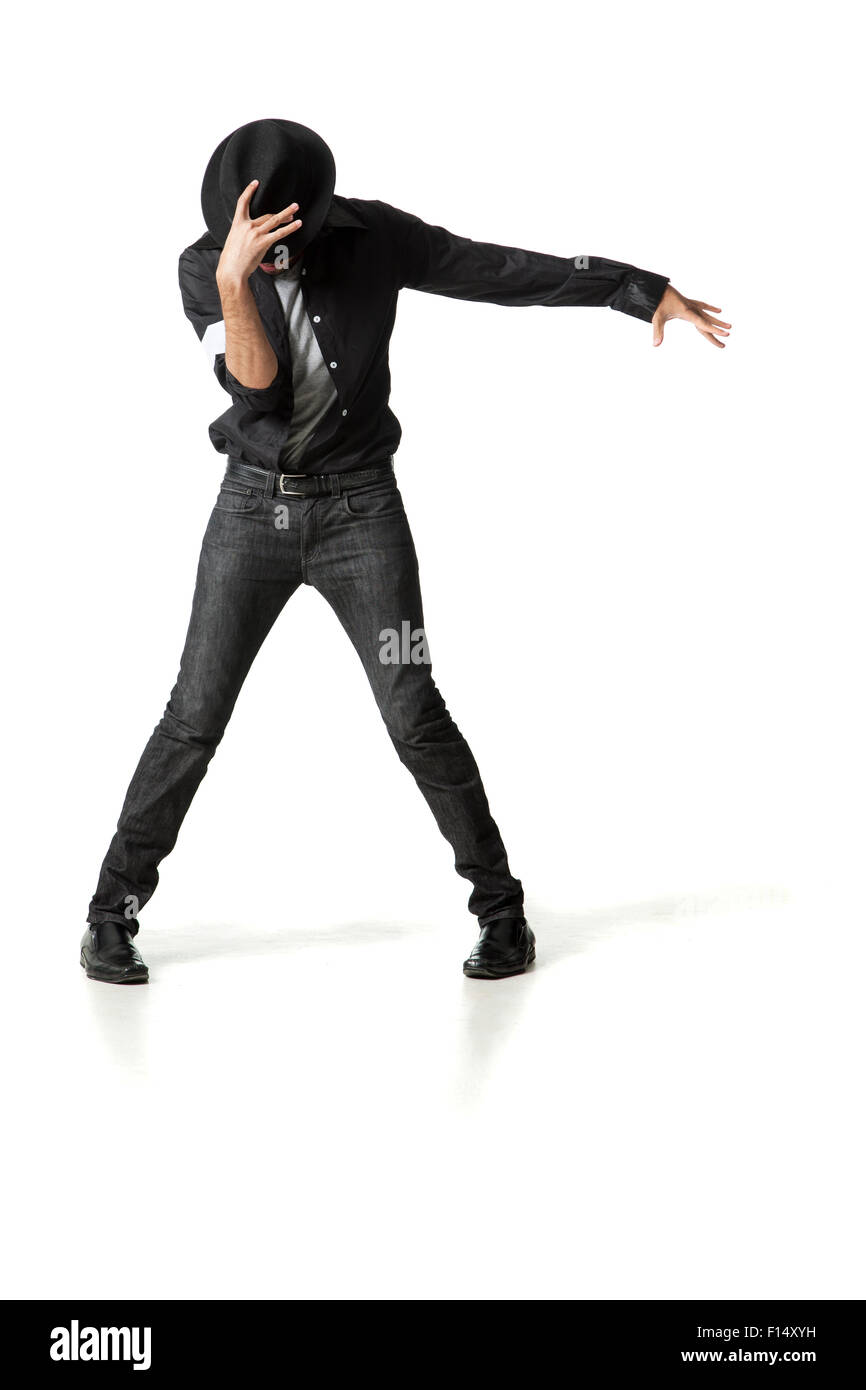 Man in fedora dancing in studio Stock Photo - Alamy