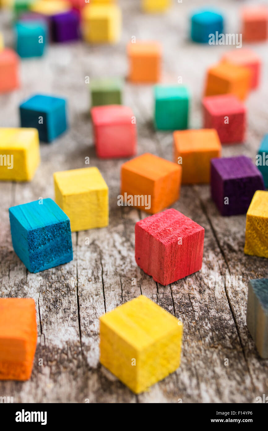 Colorful wooden building blocks. Selective focus Stock Photo - Alamy