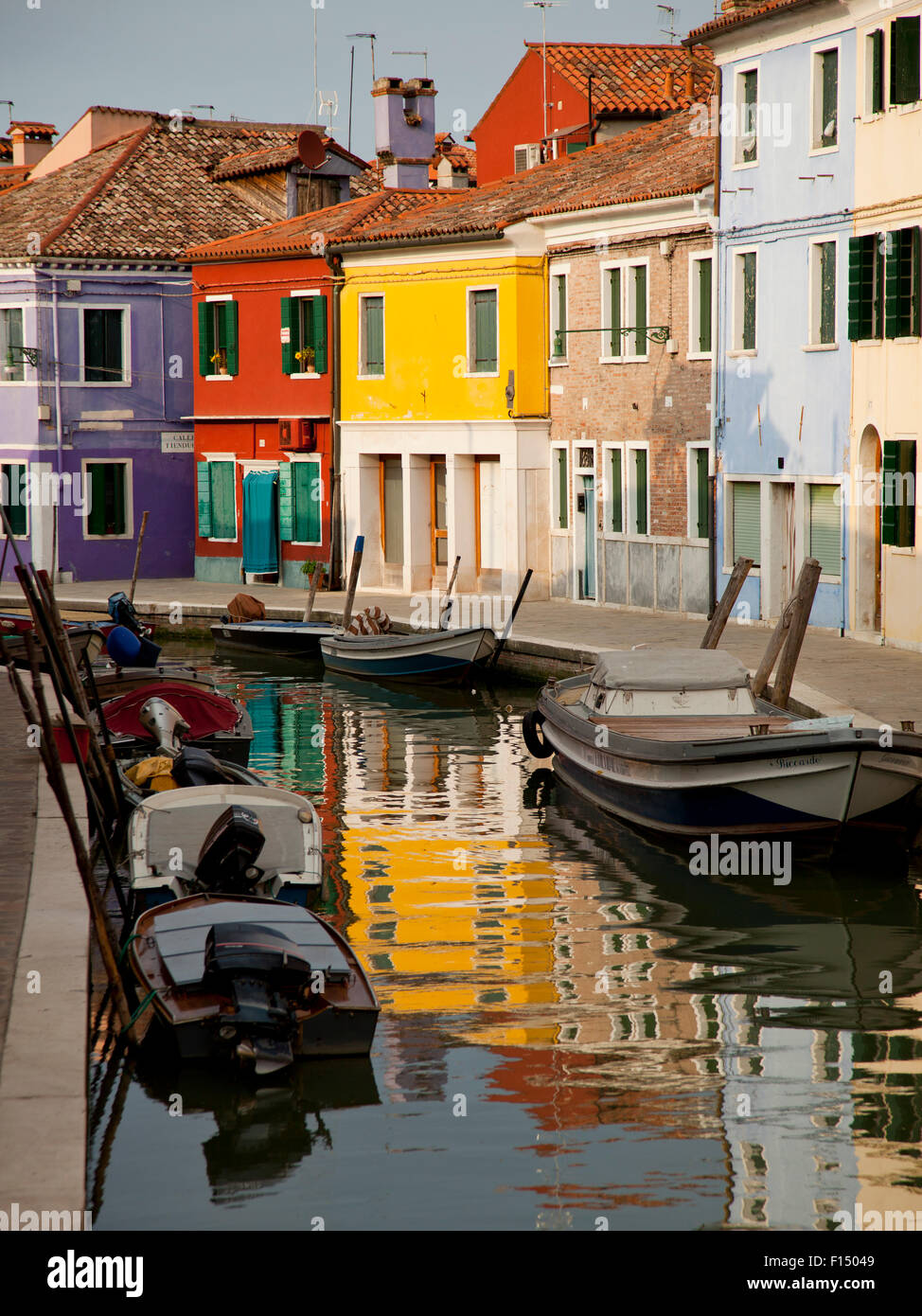 Italy, Venice, Colorful houses reflecting in canal Stock Photo - Alamy