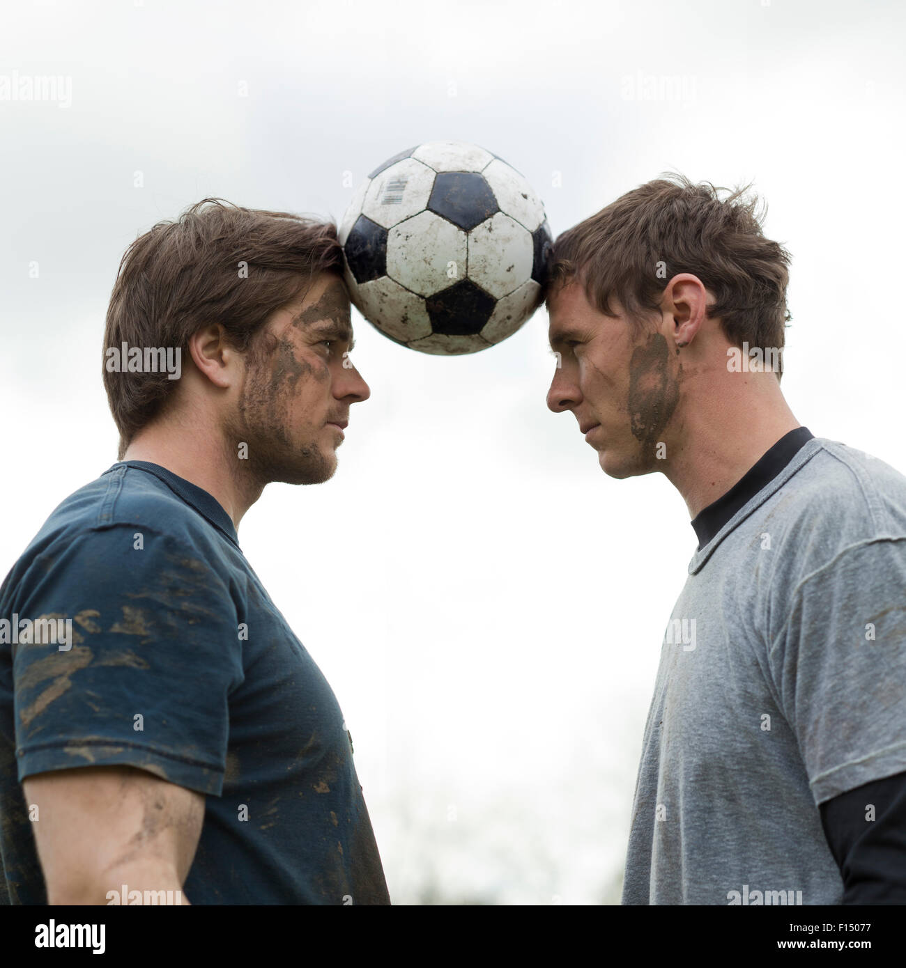 USA, Utah, Provo, Two men with ball behind them Stock Photo - Alamy