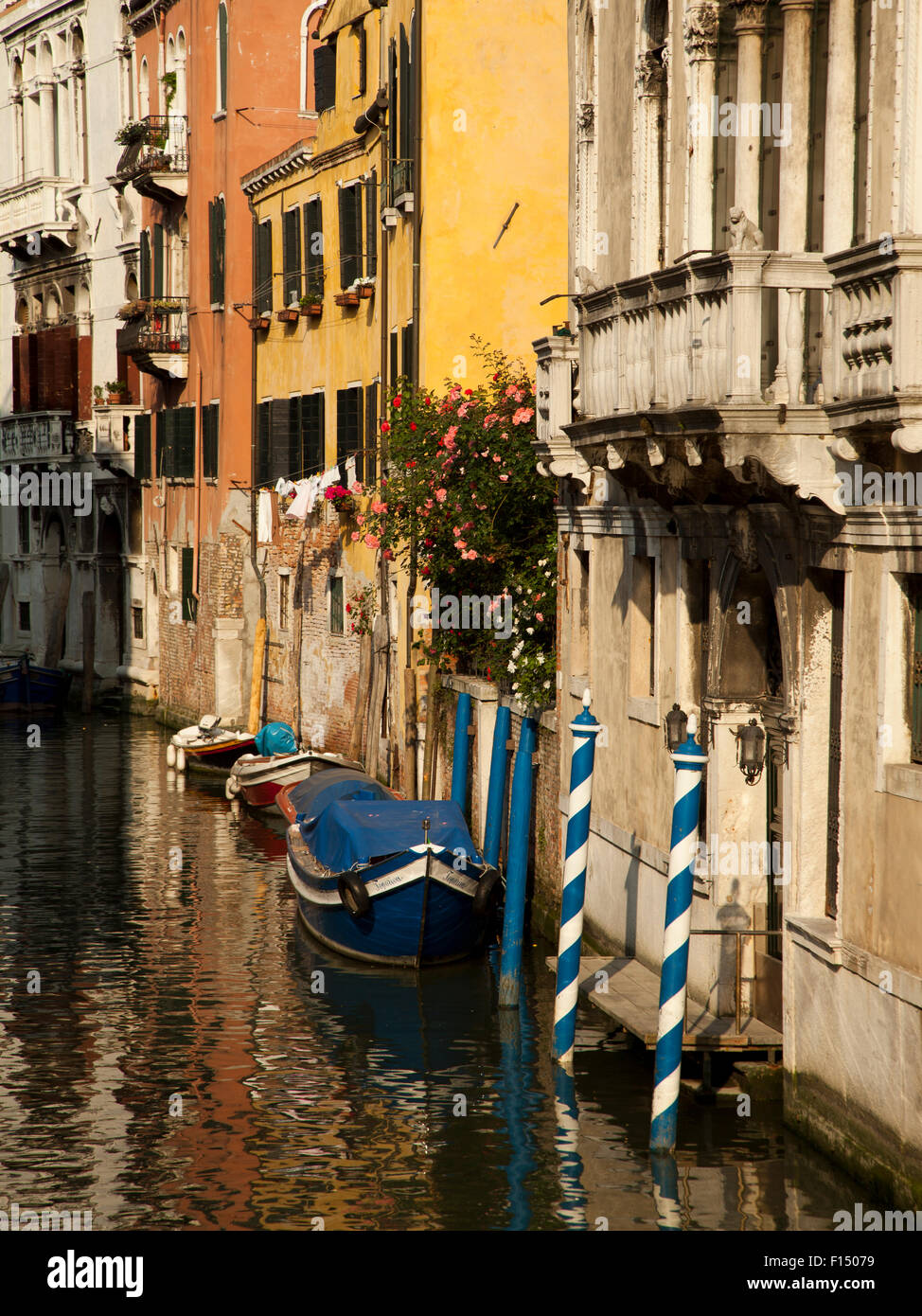 Italy, Venice, Colorful houses reflecting in canal Stock Photo - Alamy