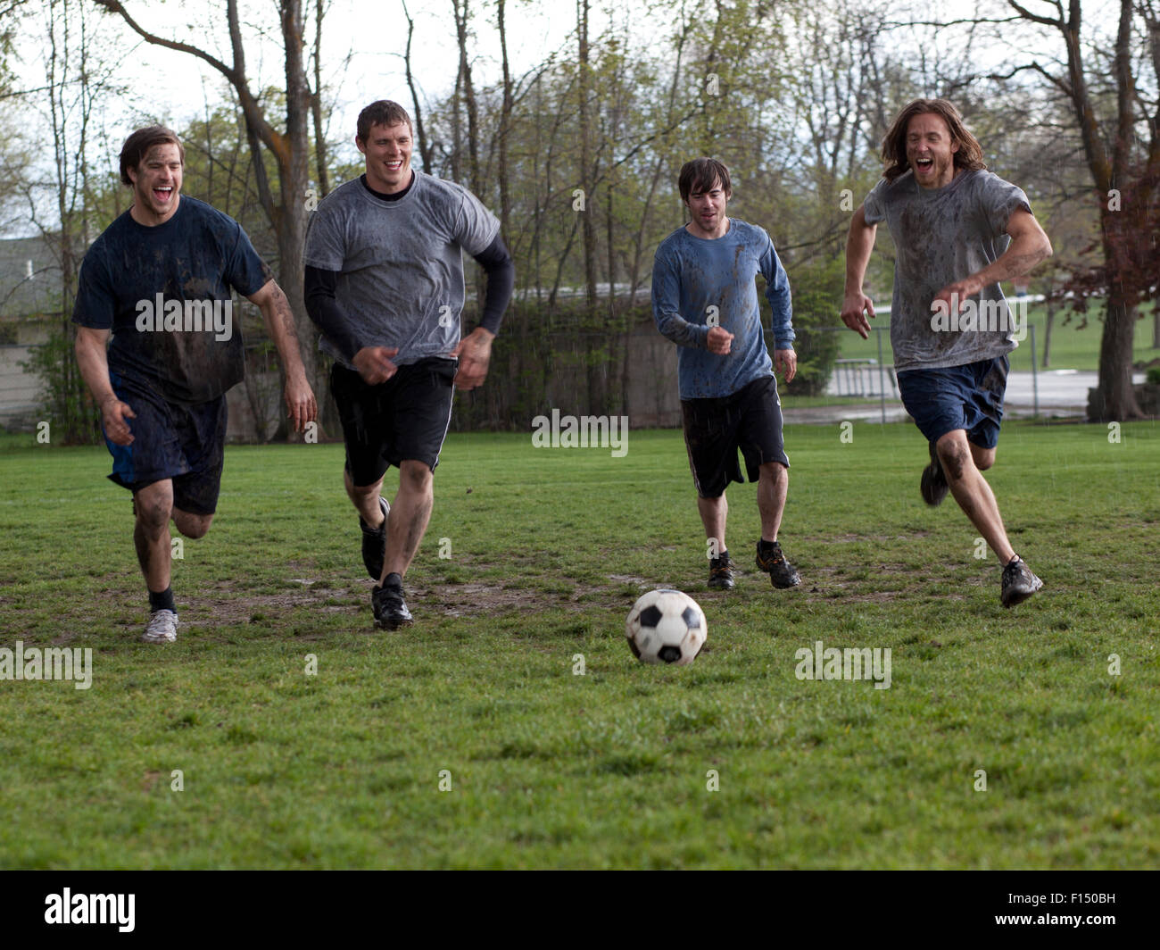 USA, Utah, Provo, Four friends playing football Stock Photo - Alamy