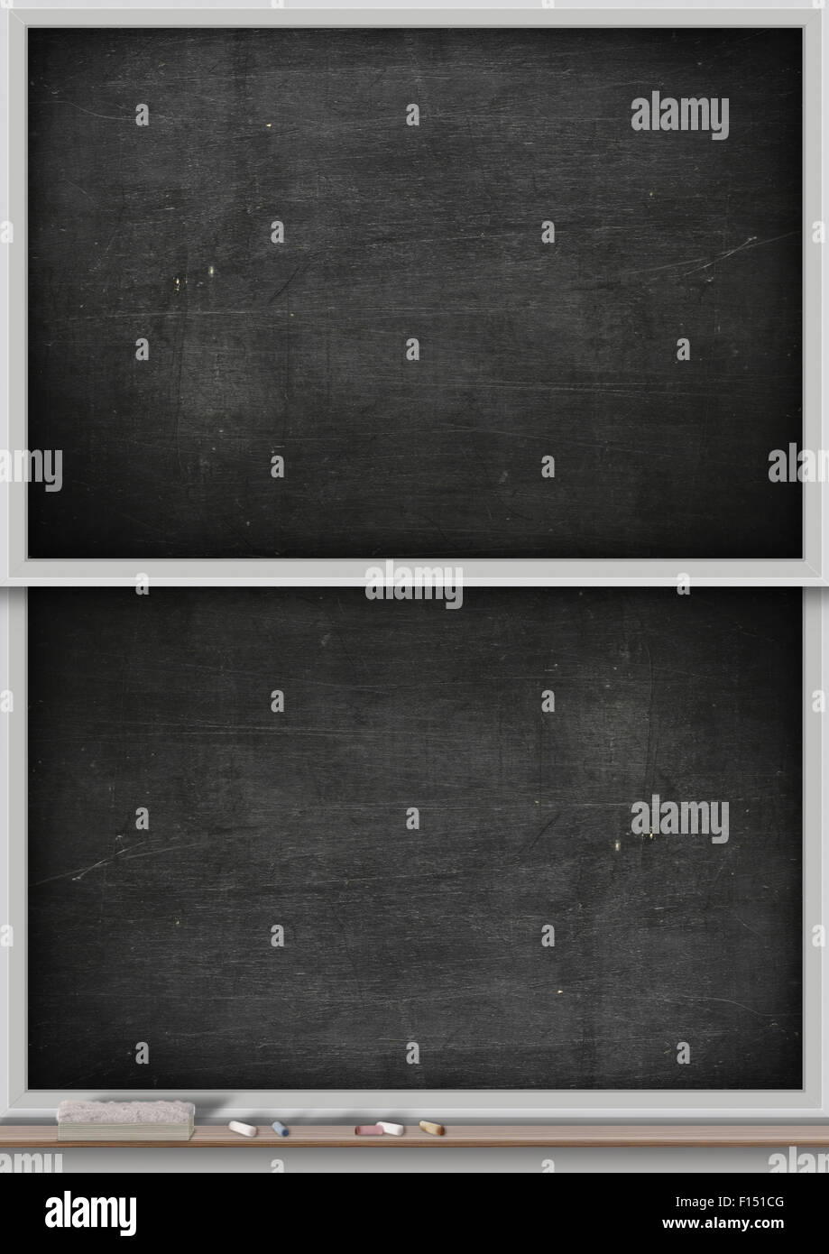 A rectangular black chalkboard with a metal frame split into two ...