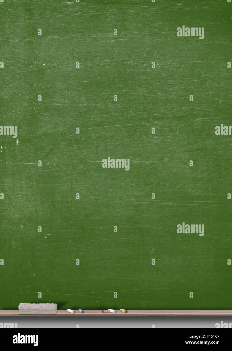 A rectangular green chalkboard with a metal frame with a wooden ledge ...