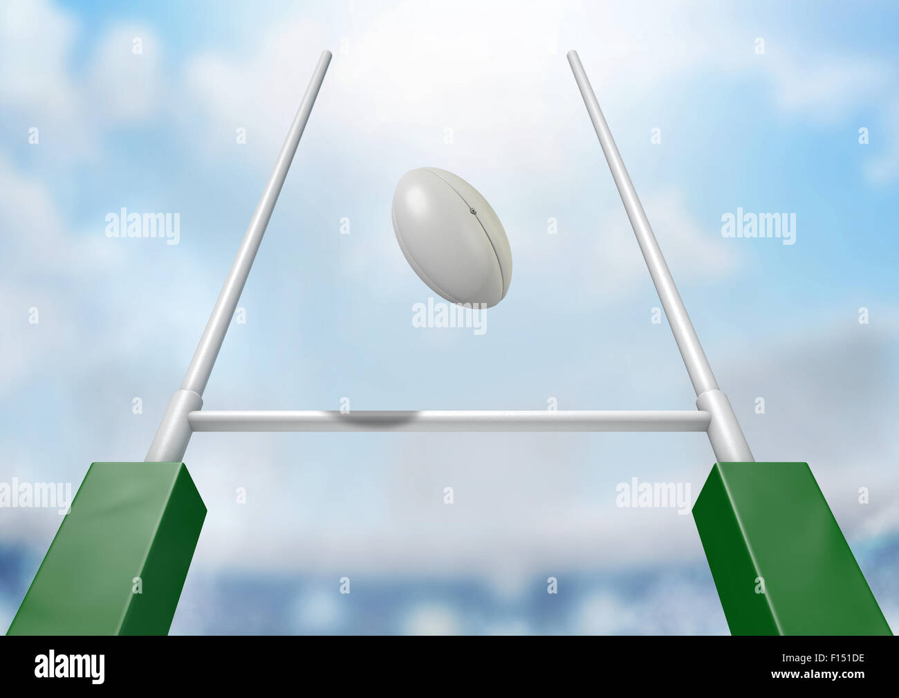 A closeup of rugby ball flying between rugby posts in a stadium under a ...