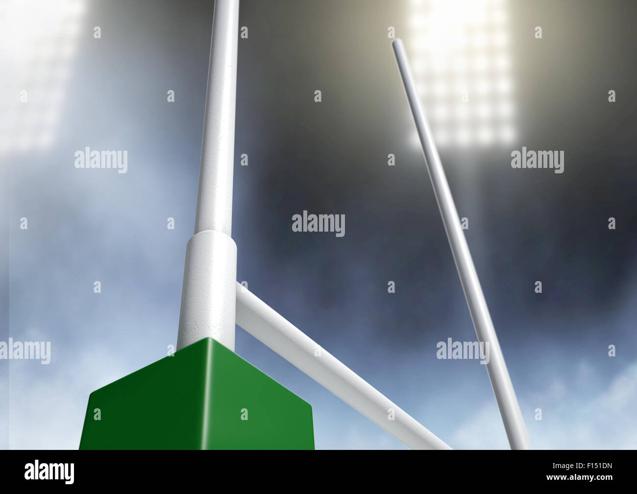 A closeup of rugby posts in a stadium under floodlights at night Stock ...