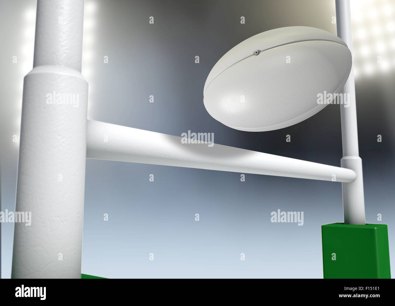 A closeup of rugby ball flying between rugby posts in a stadium under ...
