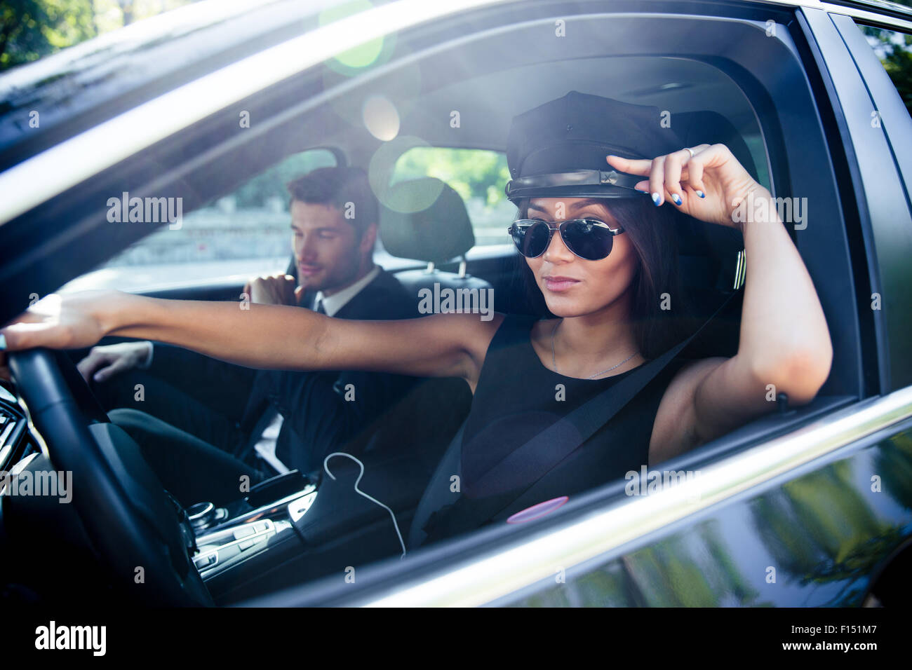 Woman drive car sunglasses hi-res stock photography and images - Alamy