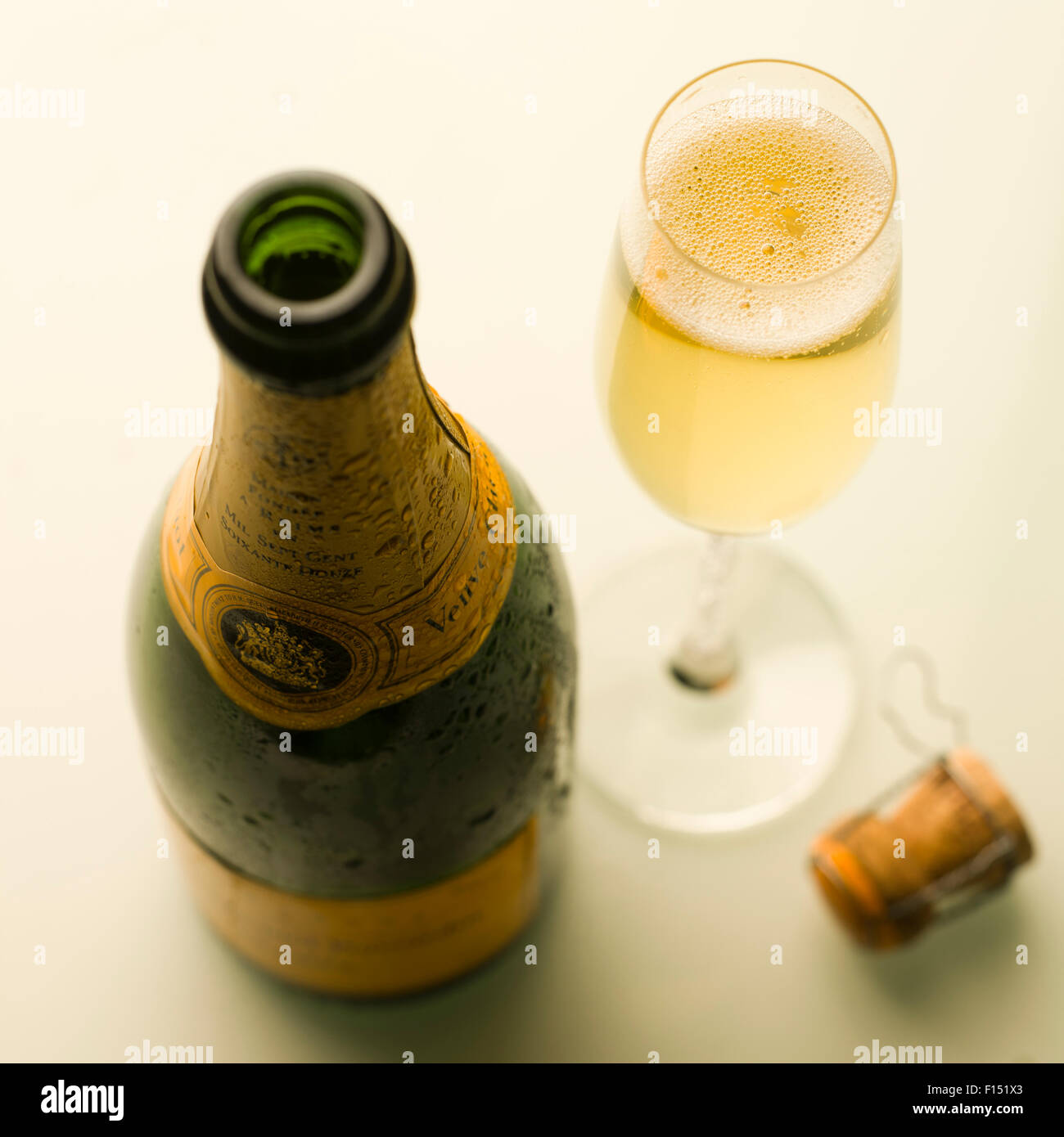 champagne bottle, cork and glass from above Stock Photo - Alamy