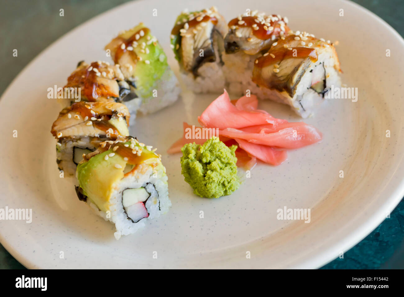 Sushi roll with avocado bbq eel and crab meat Stock Photo - Alamy