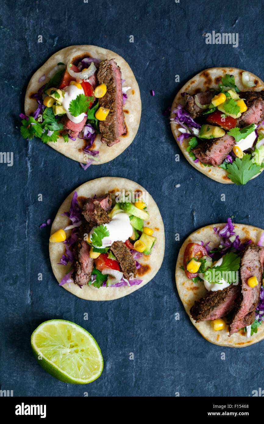Mini beef steak tortillas Stock Photo - Alamy