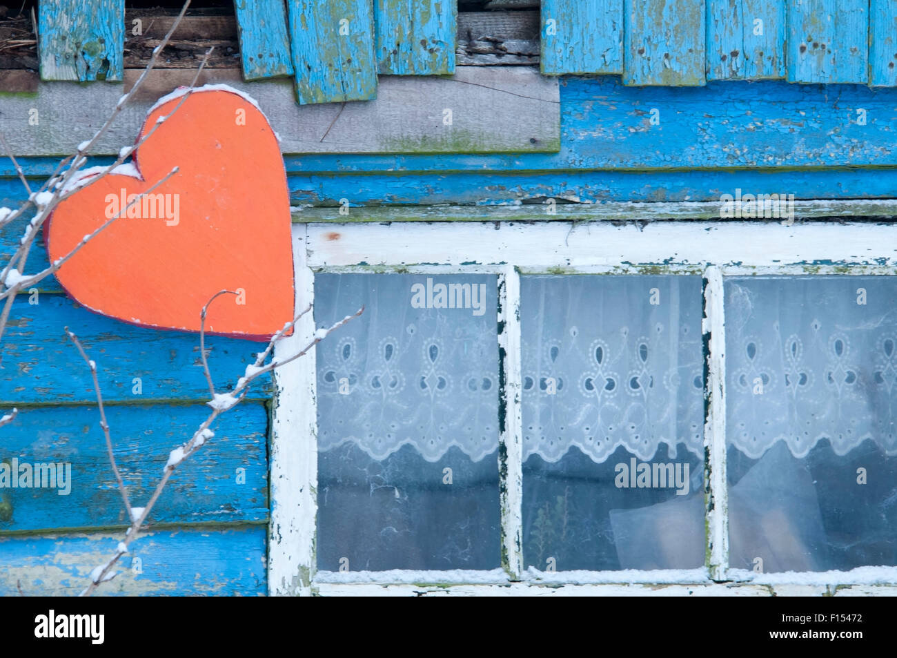 barn with red heart near window Stock Photo - Alamy