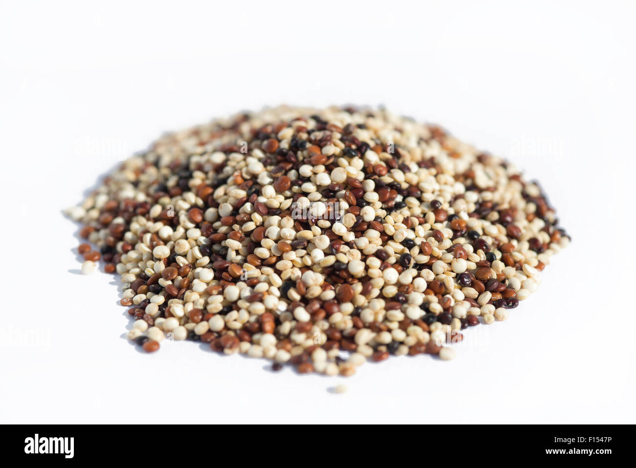 quinoa mix on white background Stock Photo - Alamy