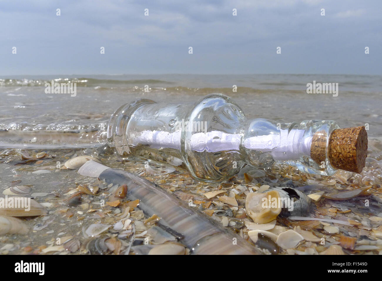 message in a bottle at sea Stock Photo - Alamy