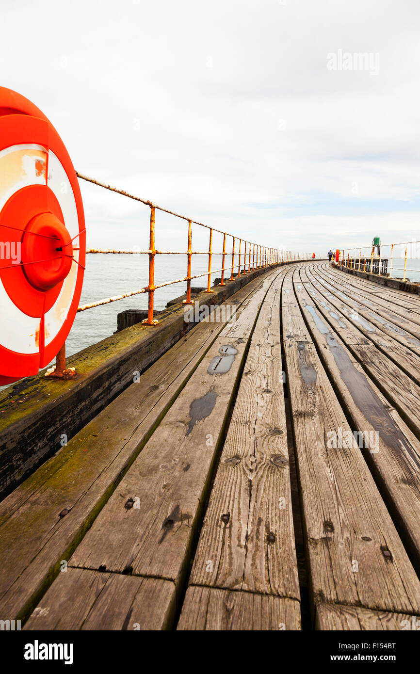 Whitby pier harbour wall harbor wooden boards floor out to sea coast ...