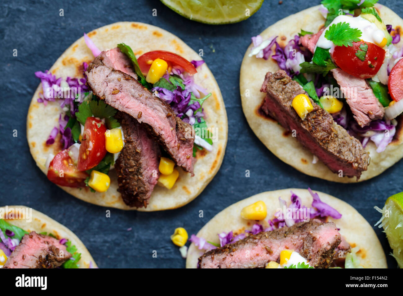 Mini beef steak tortillas Stock Photo - Alamy